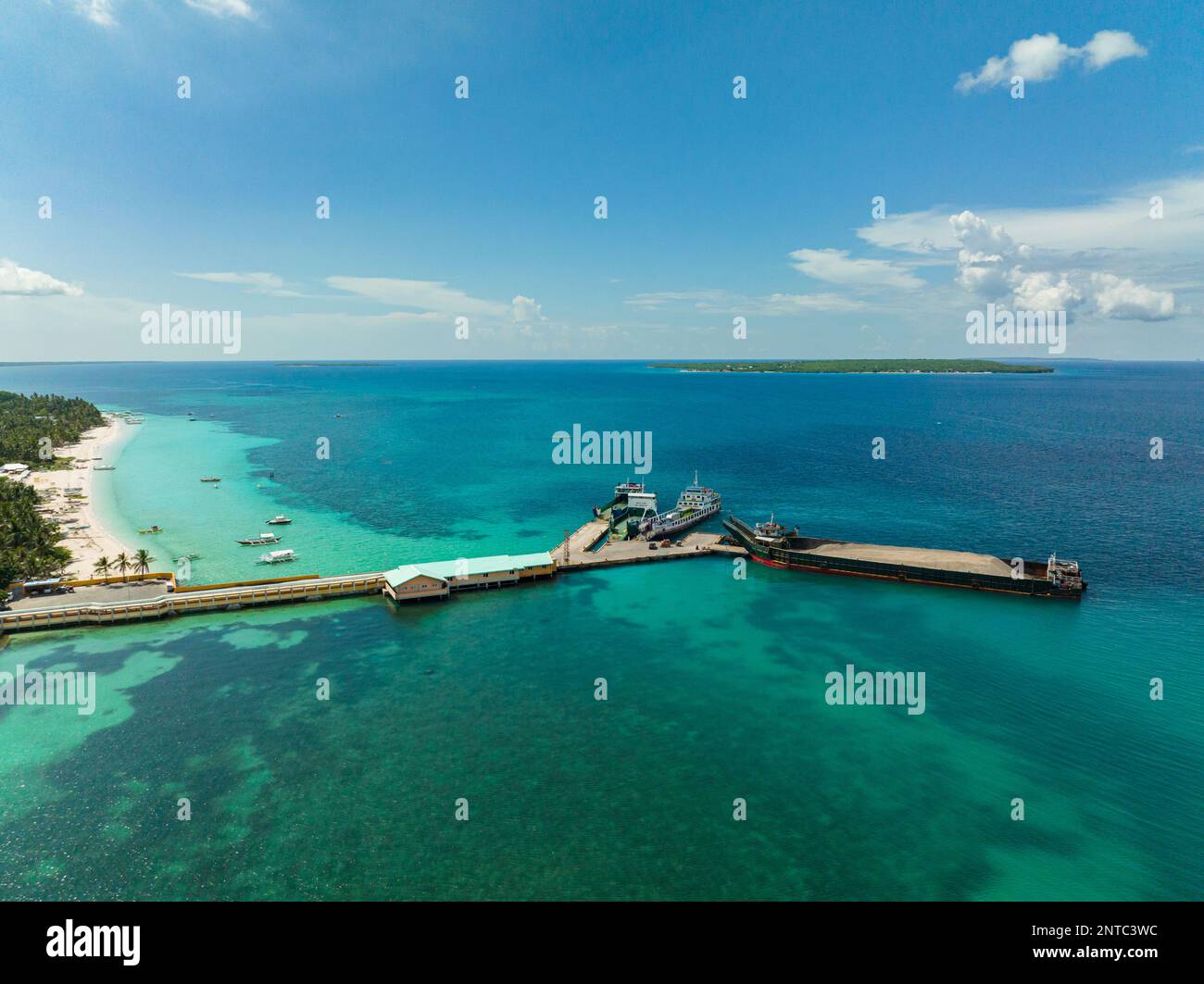 Sea port and ships on a tropical island. Bantayan island, Philippines ...