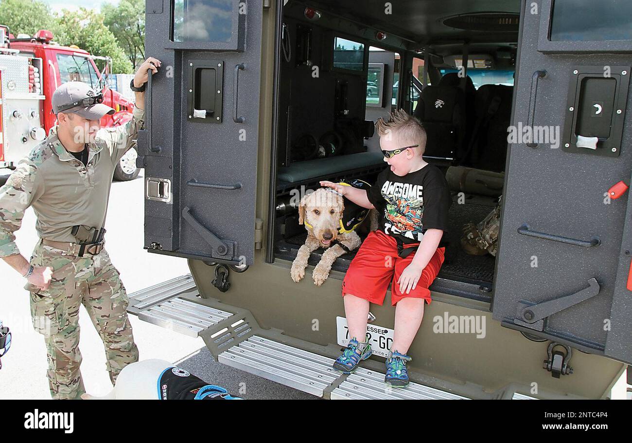 In this Thursday, June 13, 2019, photo Blake Pass, right pets his new ...
