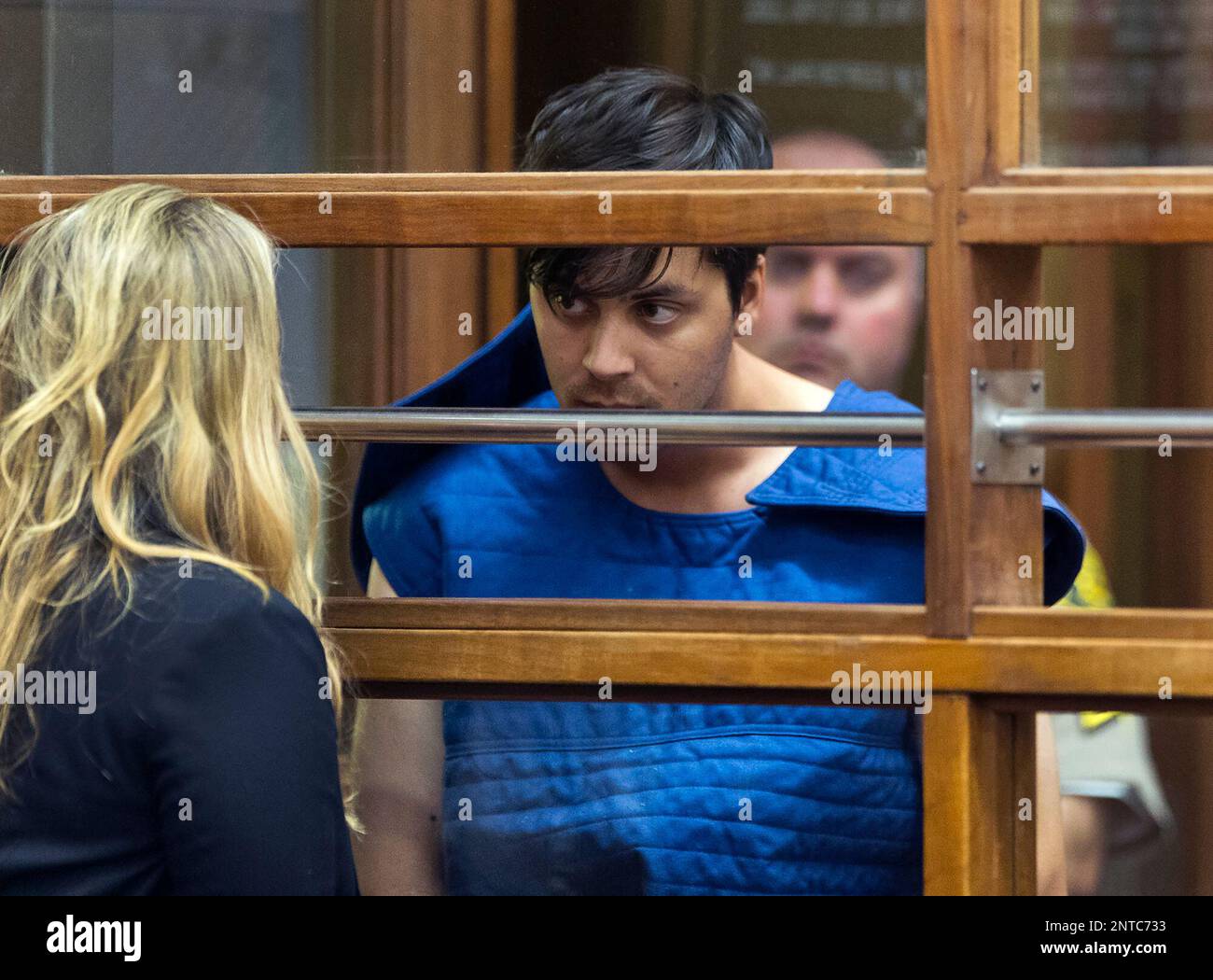 Suspect Rhett McKenzie Nelson talks to an attorney as he appears in Los ...