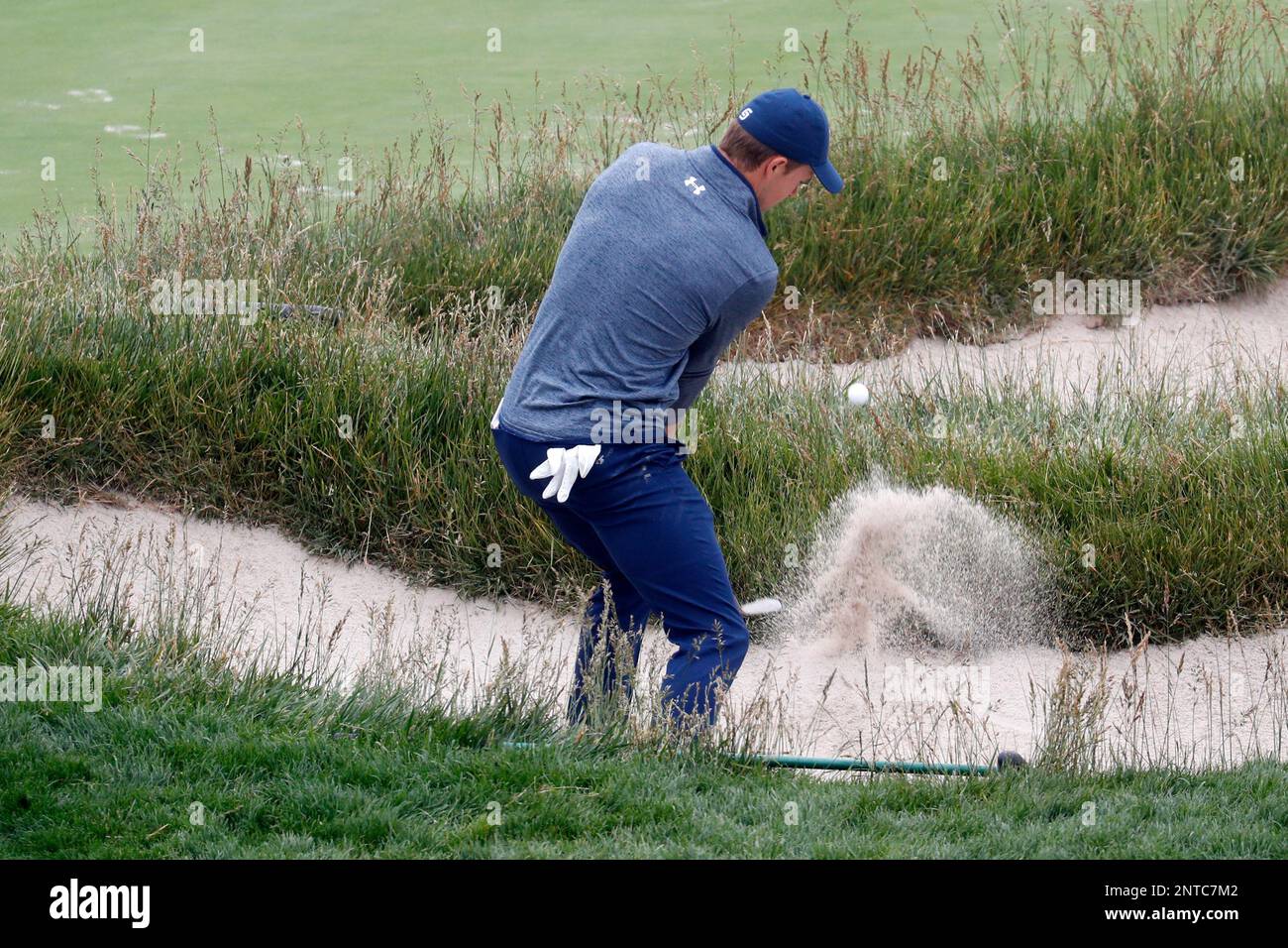 PEBBLE BEACH, CA - JUNE 12: PGA golfer Jordan Spieth hits out of a sand ...