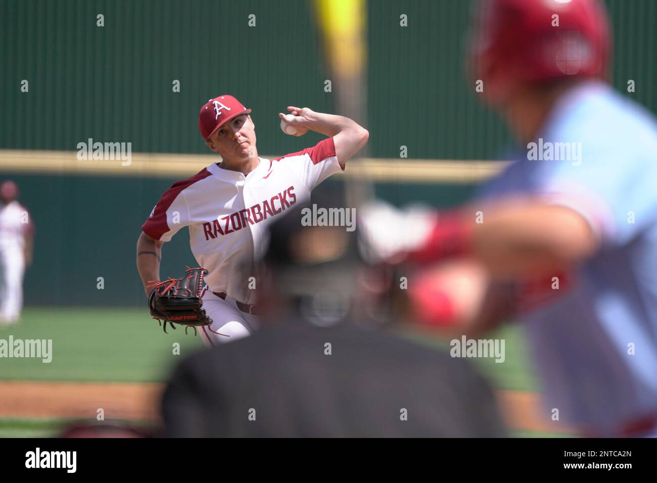 FAYETTEVILLE, AR - JUNE 10: Arkansas Razorbacks pitcher Patrick Wicklander (33) delivers a pitch ...