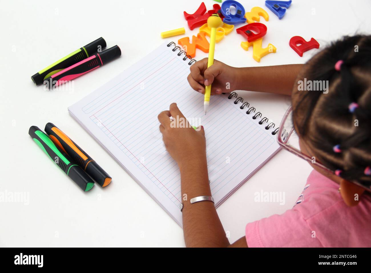 Autism child write help hi-res stock photography and images - Alamy