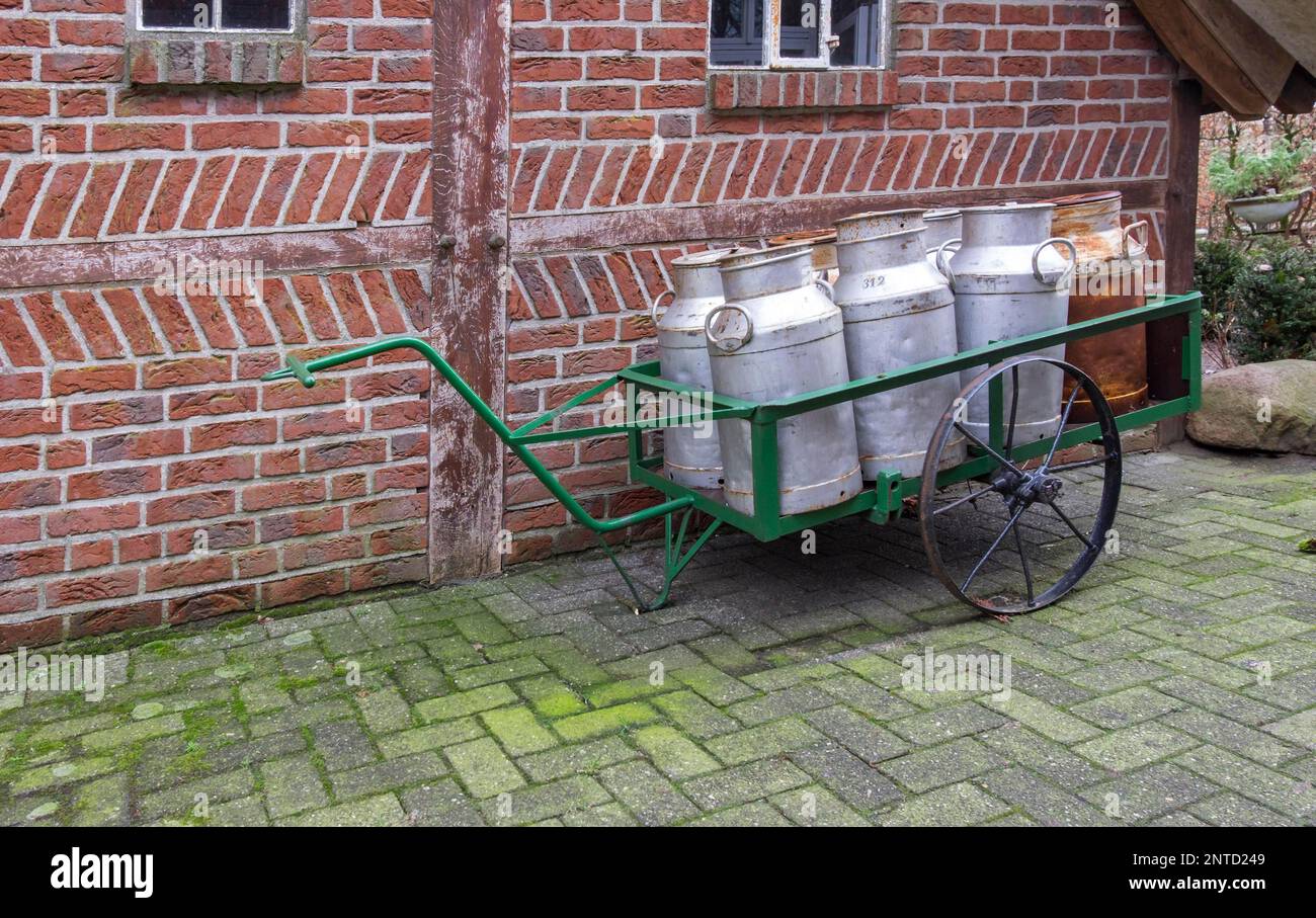 Old milk can on cart hi-res stock photography and images - Alamy