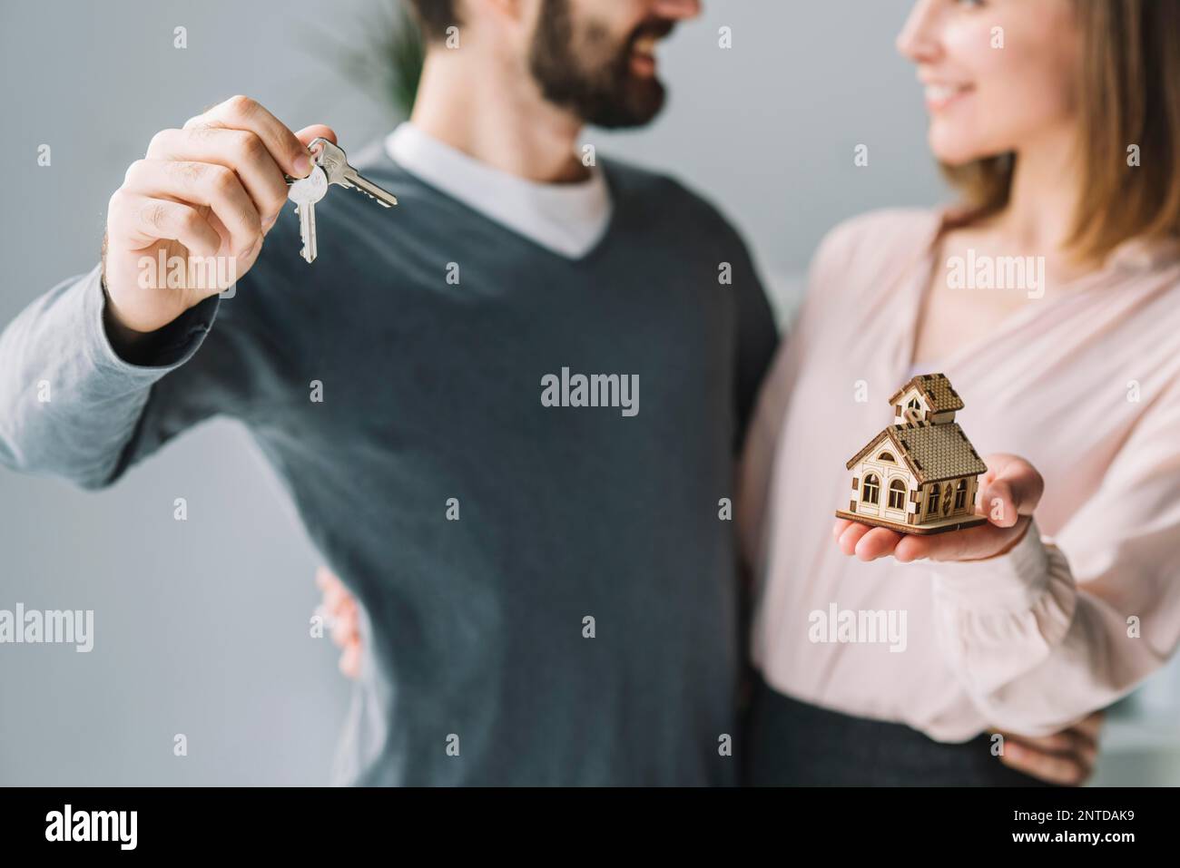 crop couple with keys house Stock Photo - Alamy