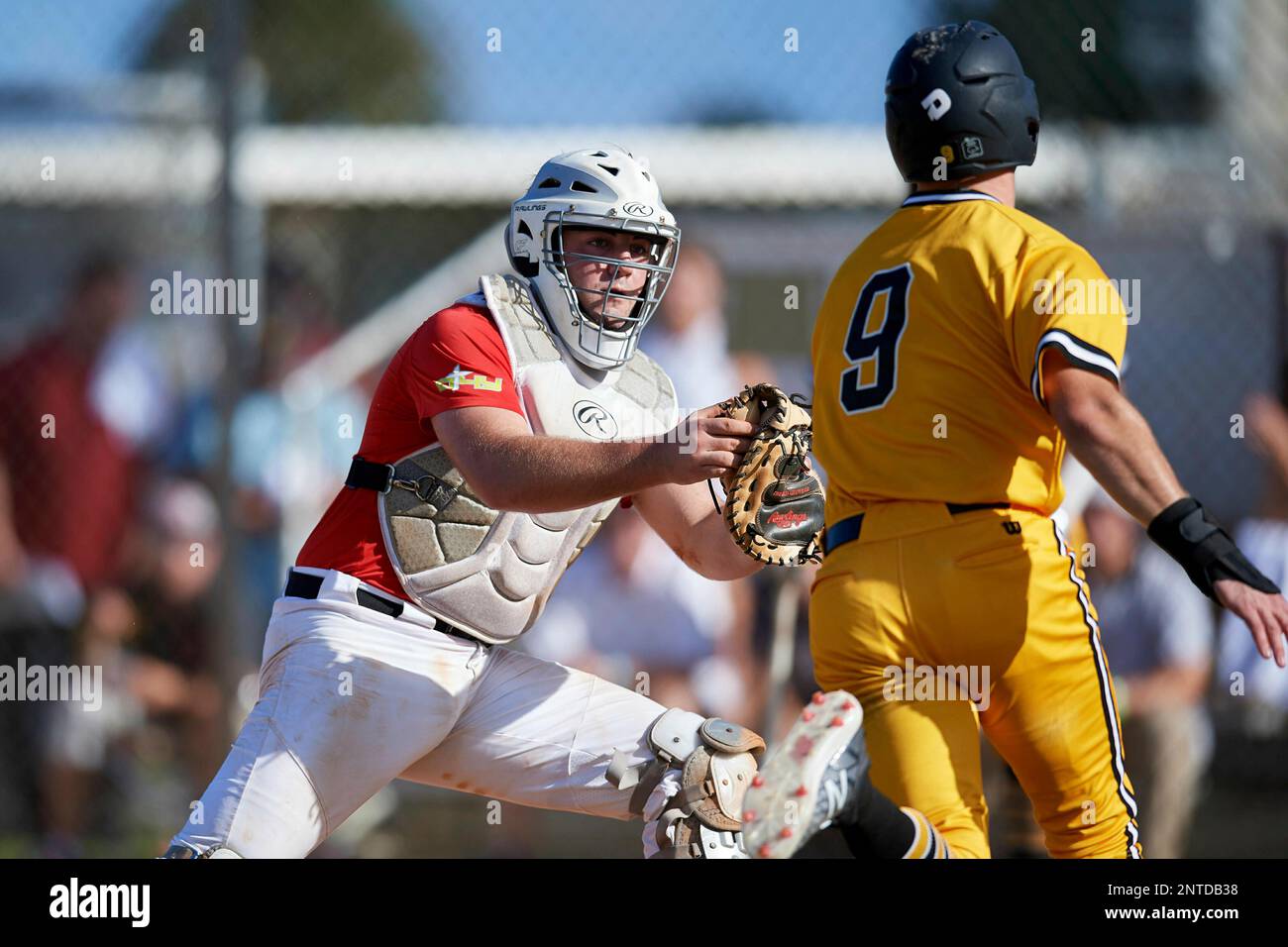 Bret Madren tags Tyler Kehoe (9) during the WWBA World Championship at ...