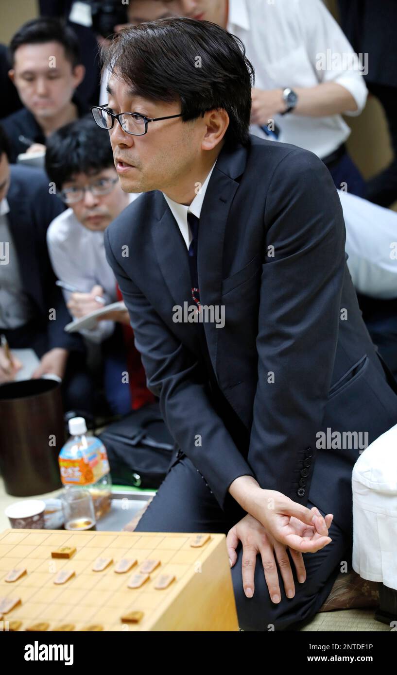 Japanese professional shogi player Yoshiharu Habu reacts after ...