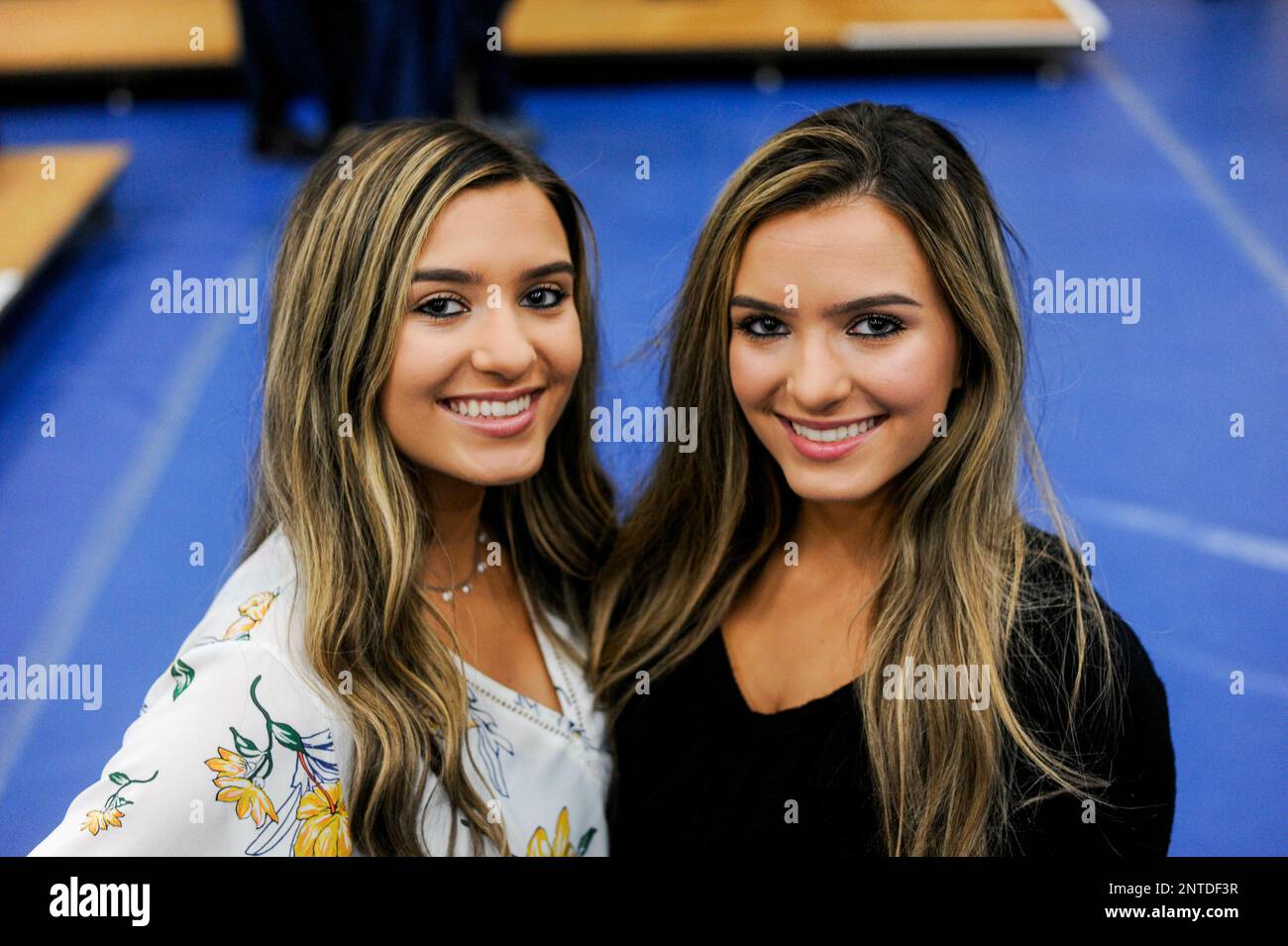 In this Friday, May 31, 2019 photo, Identical twins Maria, left, and ...