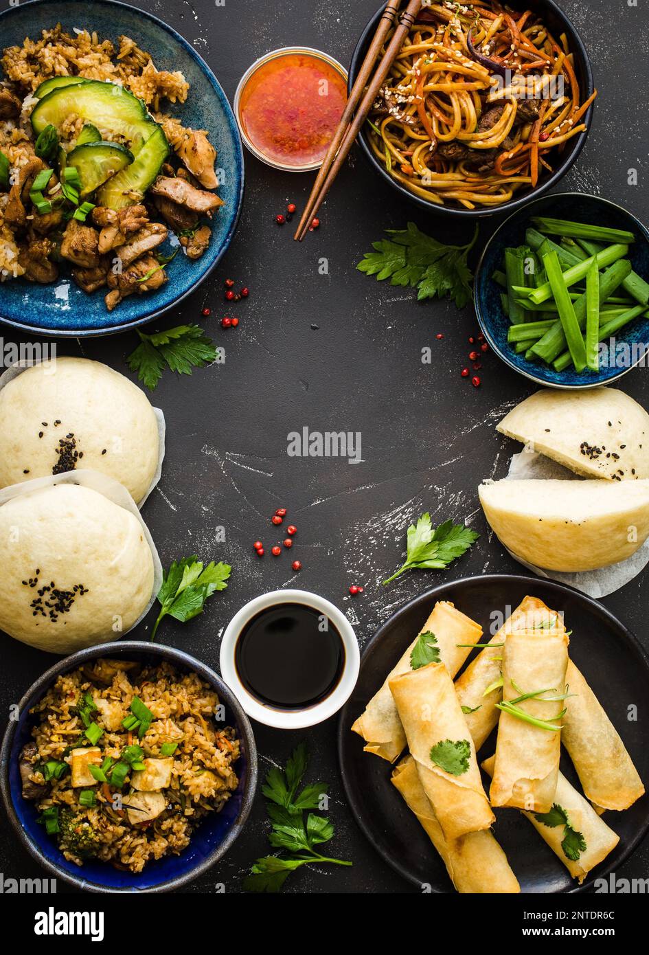 Asian assorted food set, dark rustic stone background. Chinese dishes ...