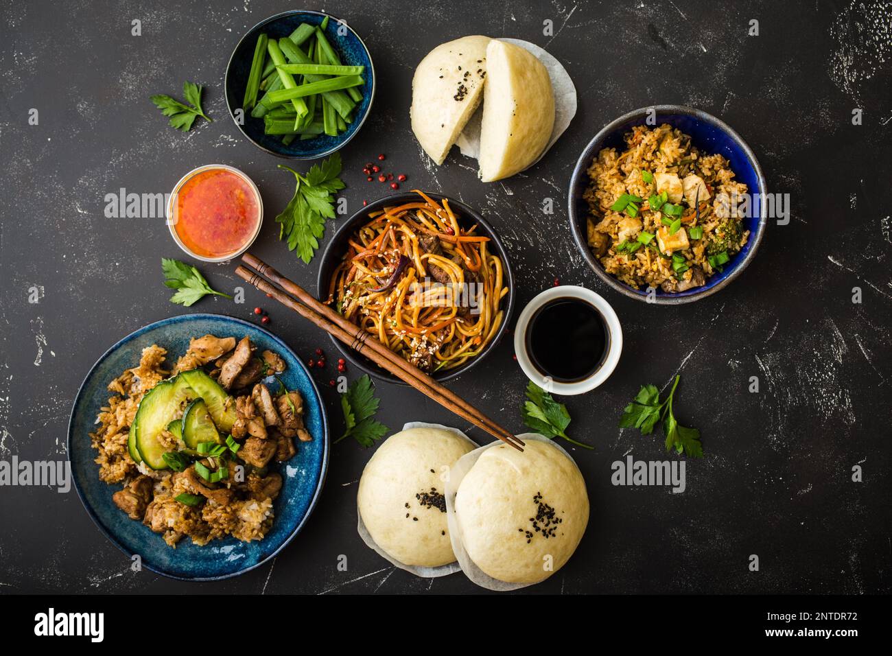 Asian assorted food set, dark rustic stone background. Chinese dishes ...