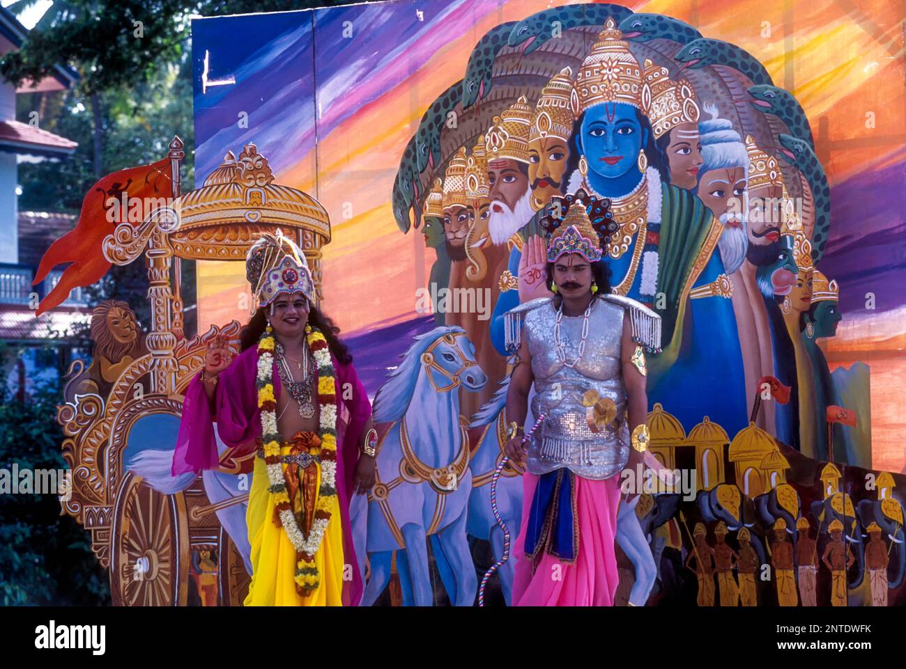 Drama artists in a festival procession dressed like lord Vishnu and ...