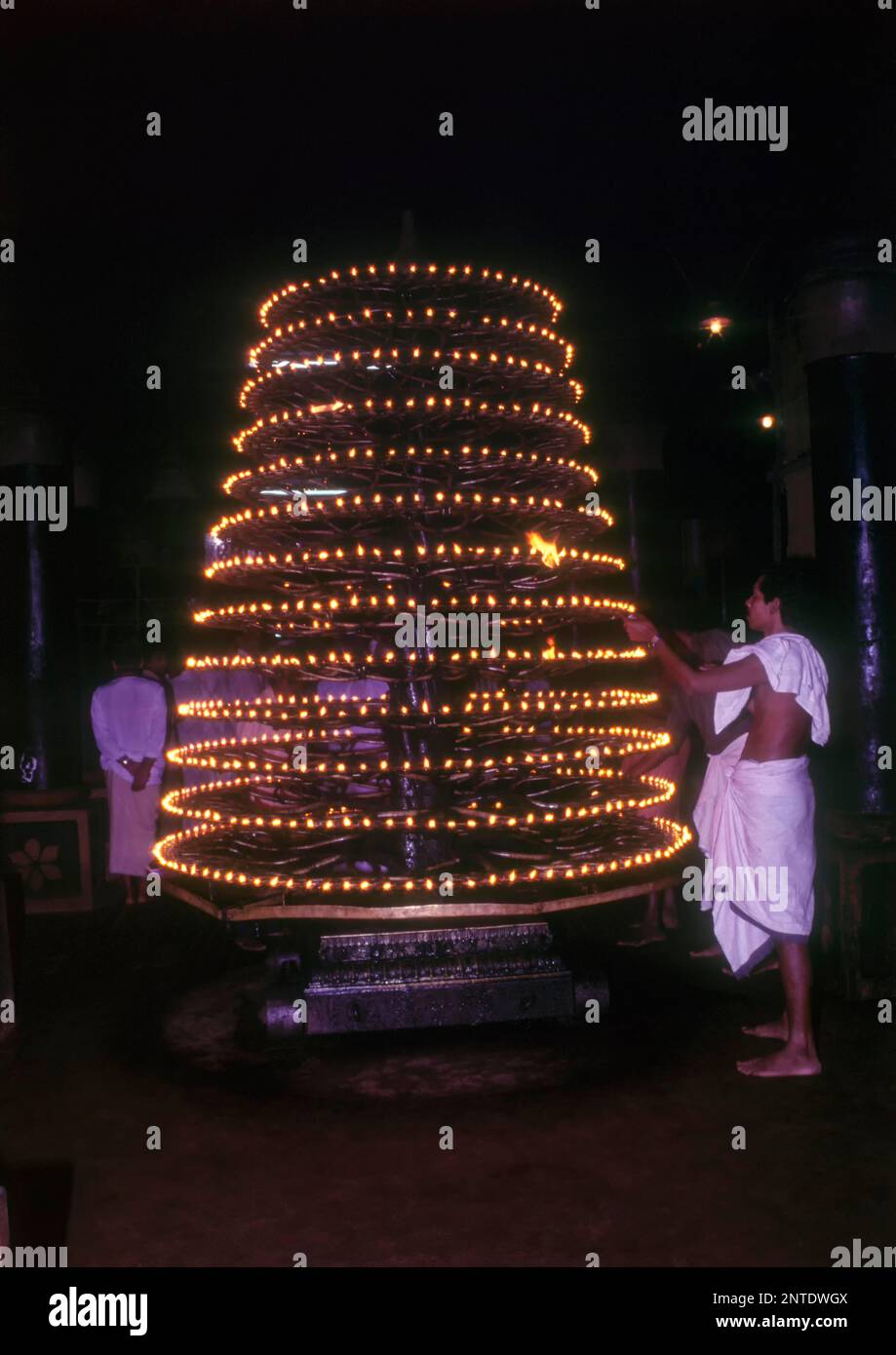 Big temple lamp in India. The 1000 wich oil lamp in the Chettikulangara ...