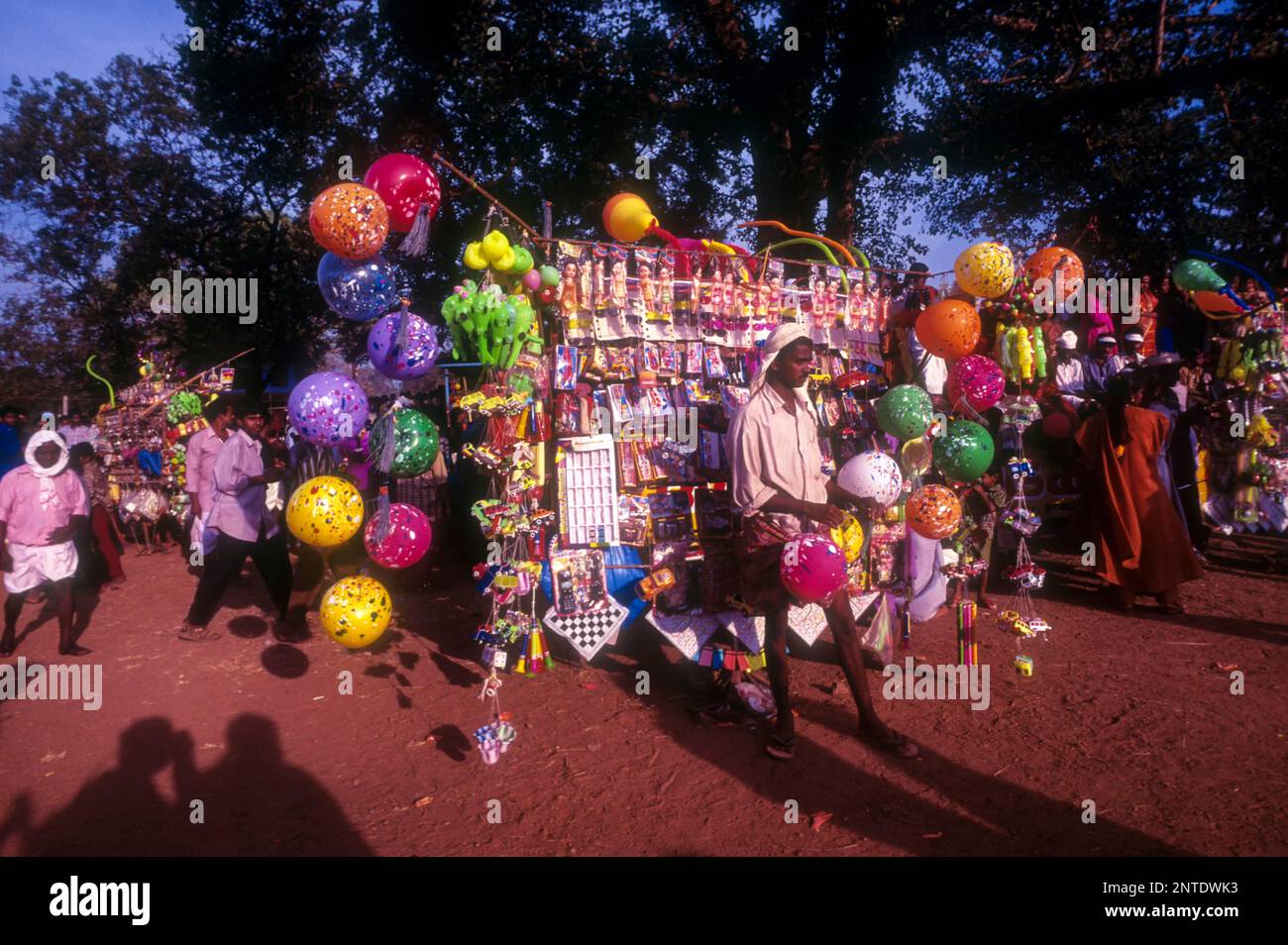 A traditional balloon vendor selling balloons during Anthimahakalan ...