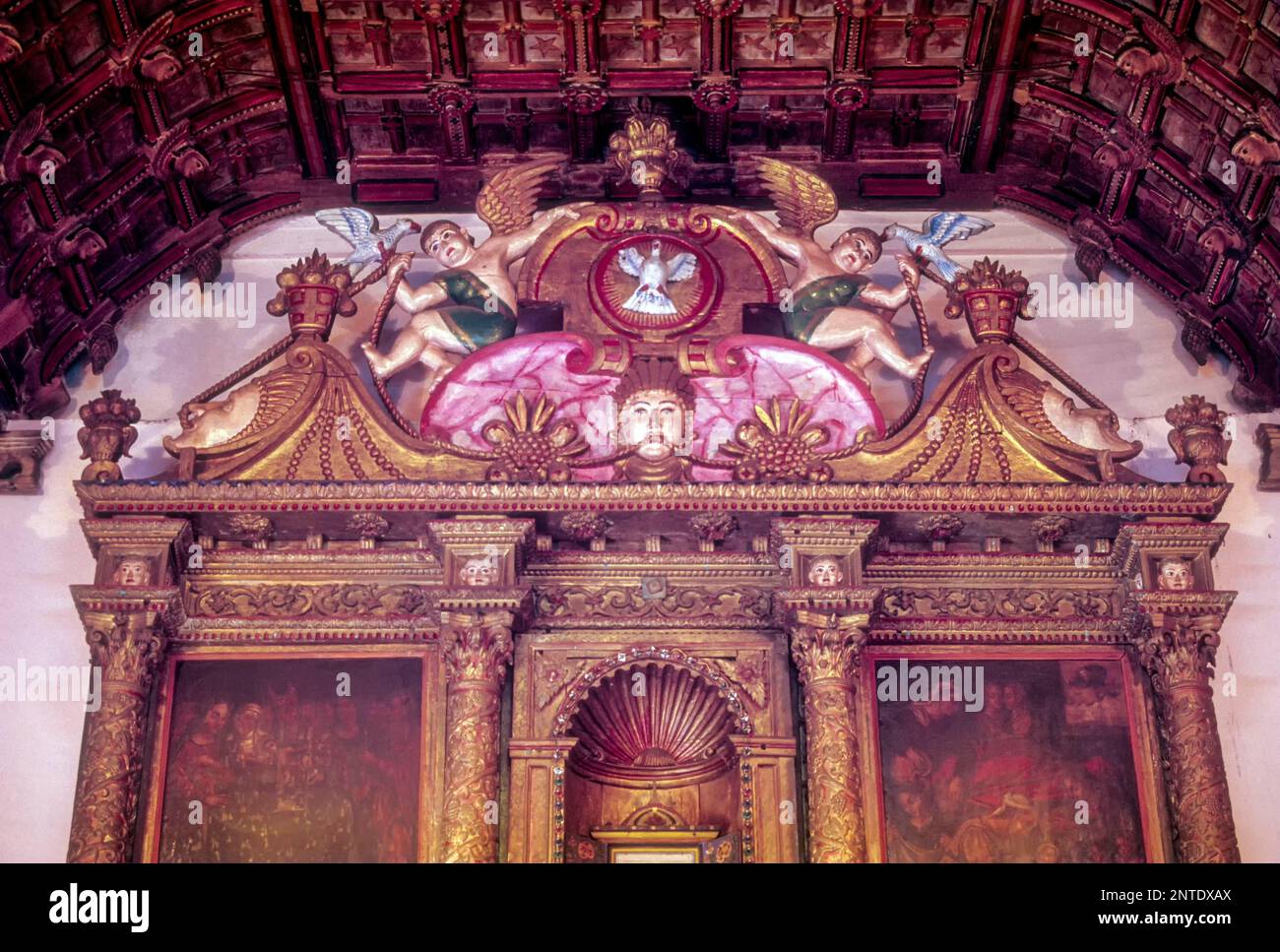 Mural paintings and carvings behind the Altar in St. Mary's Knanaya ...