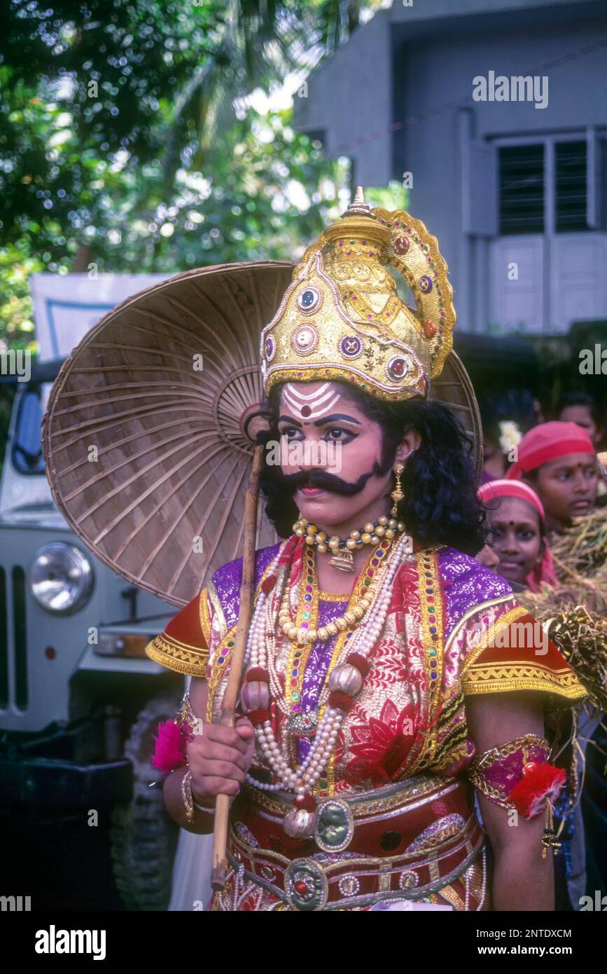 Maveli Or King Mahabali Model Dressing With Ornaments And Umbrella For