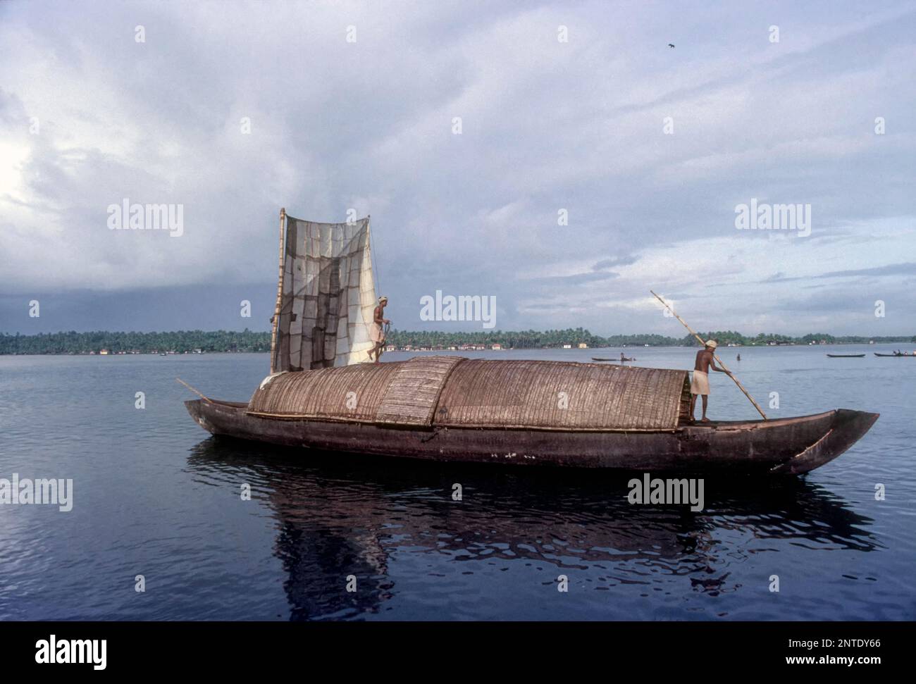 A dhow cargo boat in Kollam Quillon backwaters, Kerala, South India ...