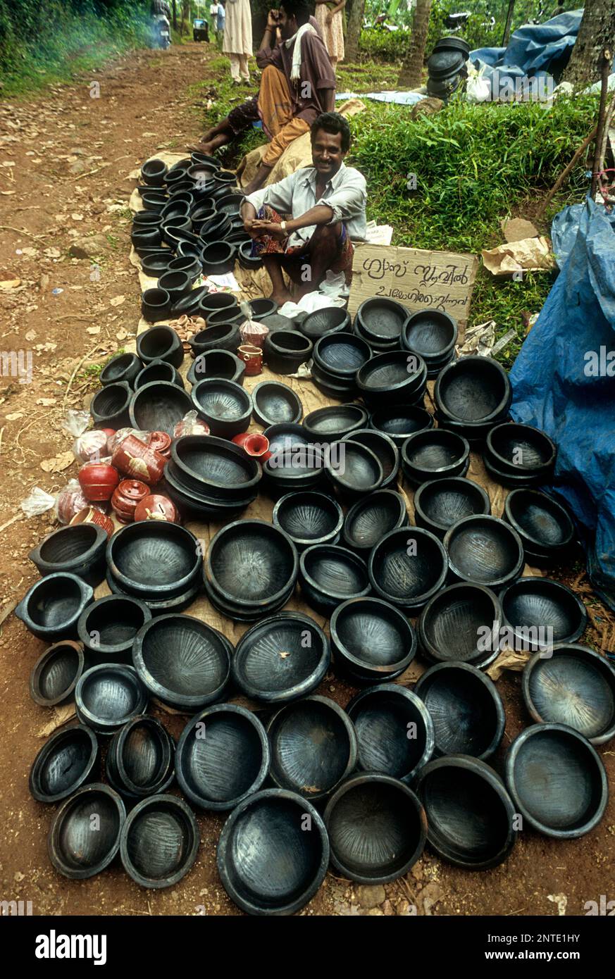 A pot seller near Saraswathi Temple at Panachikadu near Kottayam ...