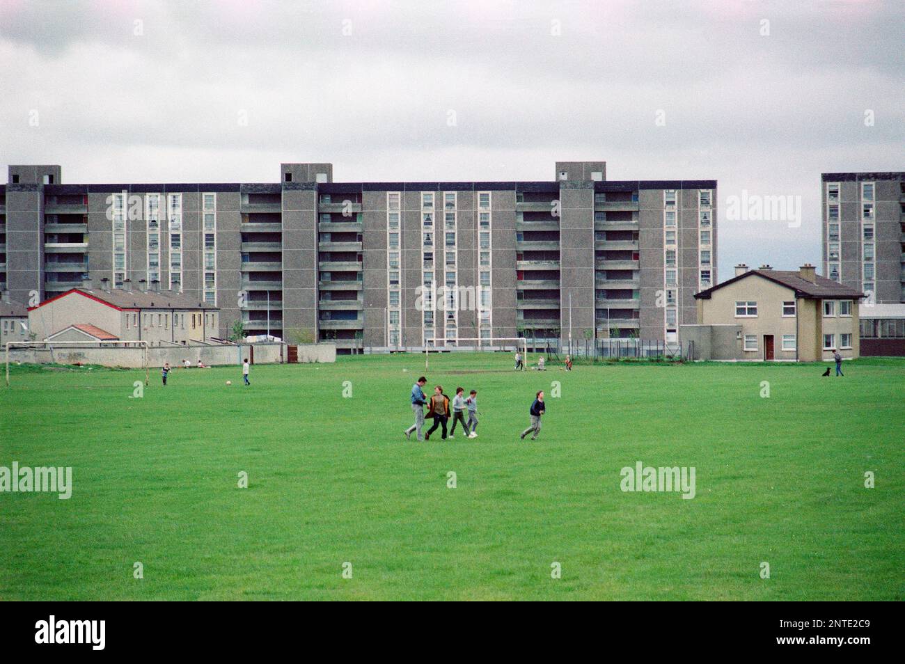 Children playing on lawn, rented flats, Coultry Road, Ballymun, Dublin ...