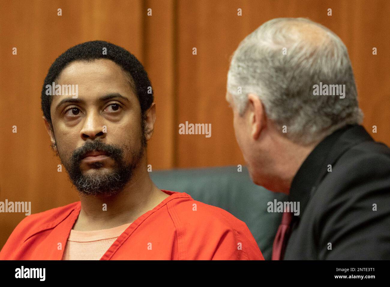 Isaiah Joel Peoples speaks with defense attorney Richard Weese during ...