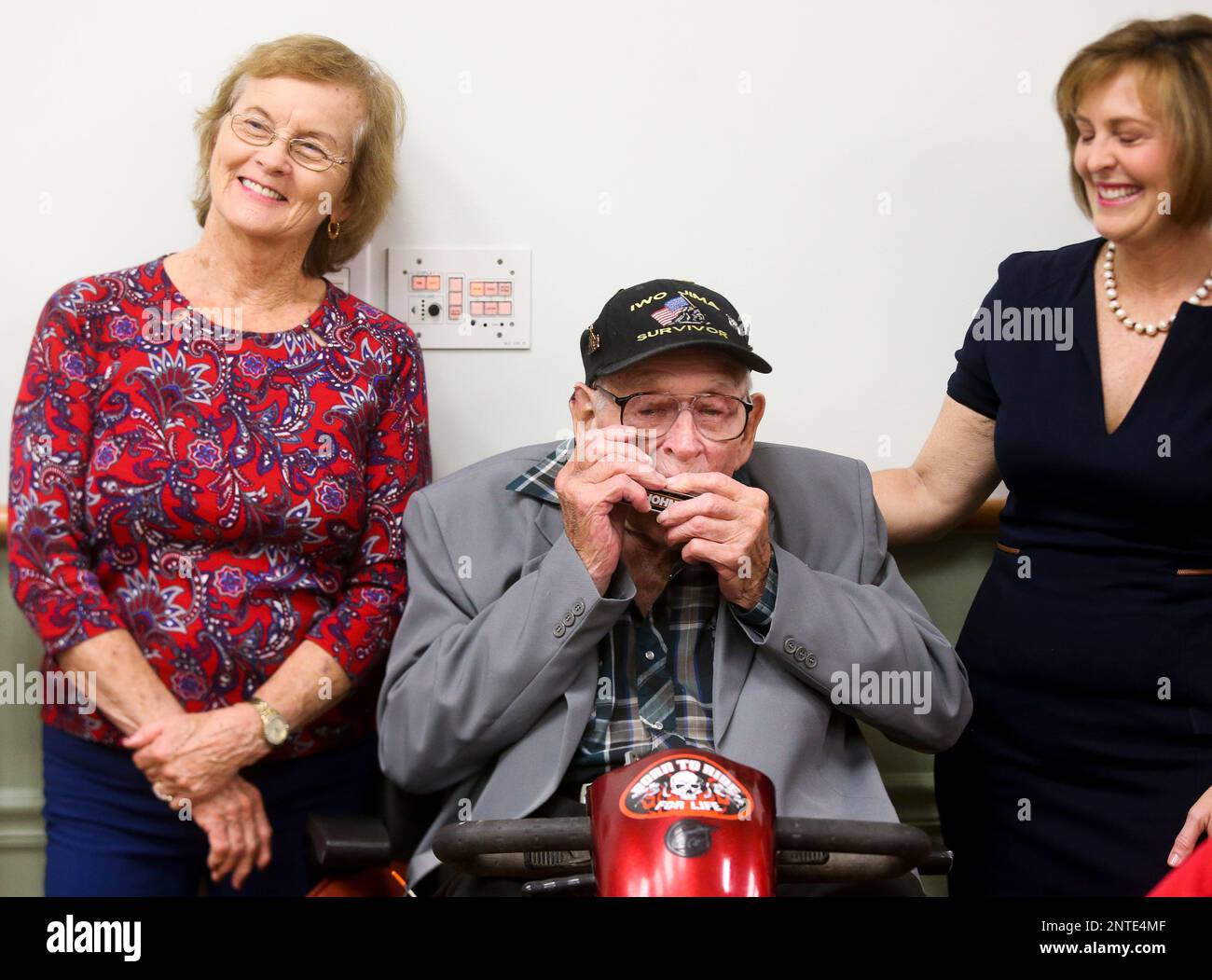 In this Friday, May 24, 2019 photo, Raymond Loring Chambers, center, a ...