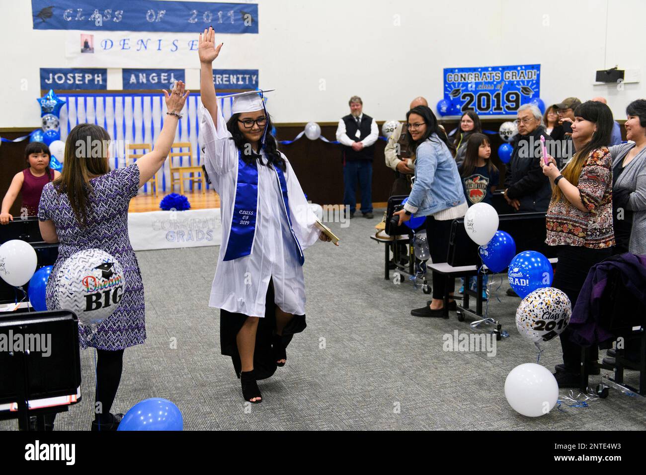 In this photo taken May 16, 2019, Denise Kalmakoff high-fives teacher's ...
