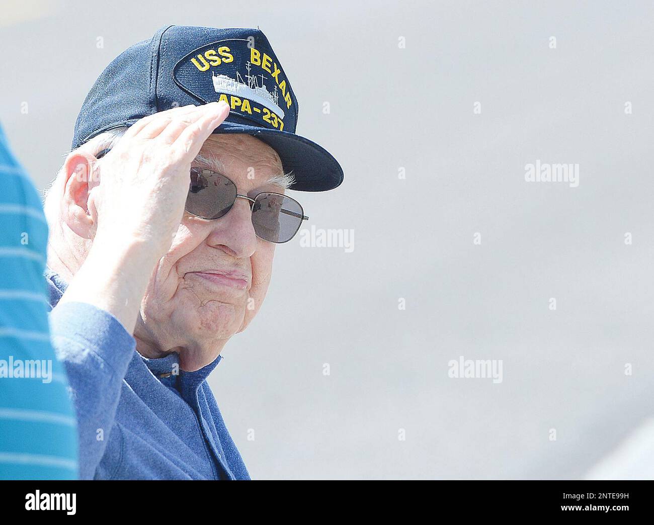 John Rummel, a U.S. Navy veteran of the Koran conflict, saltues during ...