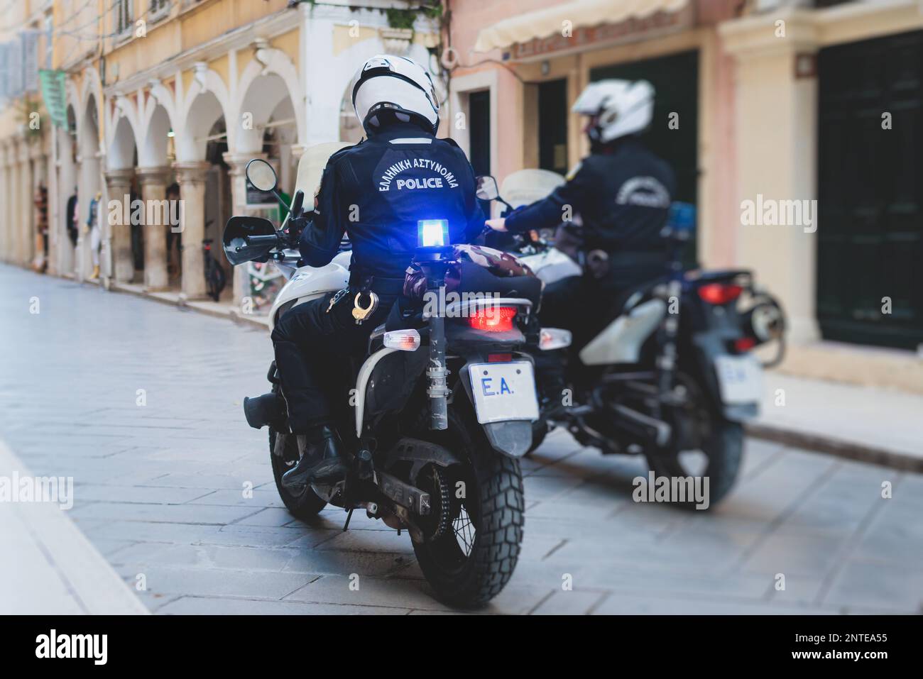 Greek police squad formation on duty riding bike and motorcycle and ...