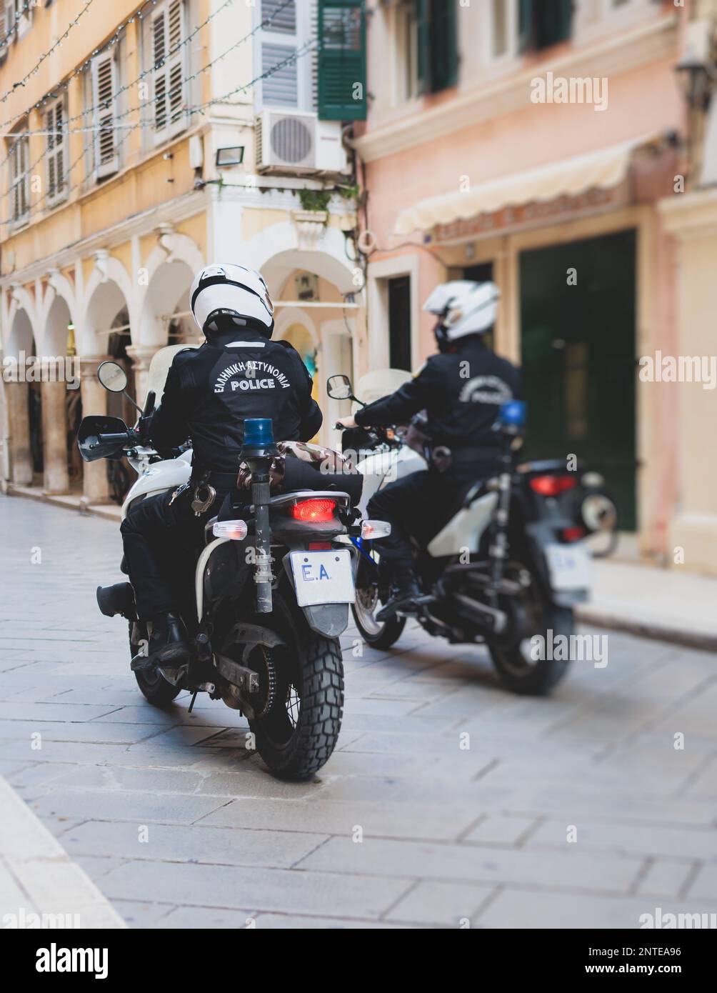 Greek police squad formation on duty riding bike and motorcycle and ...