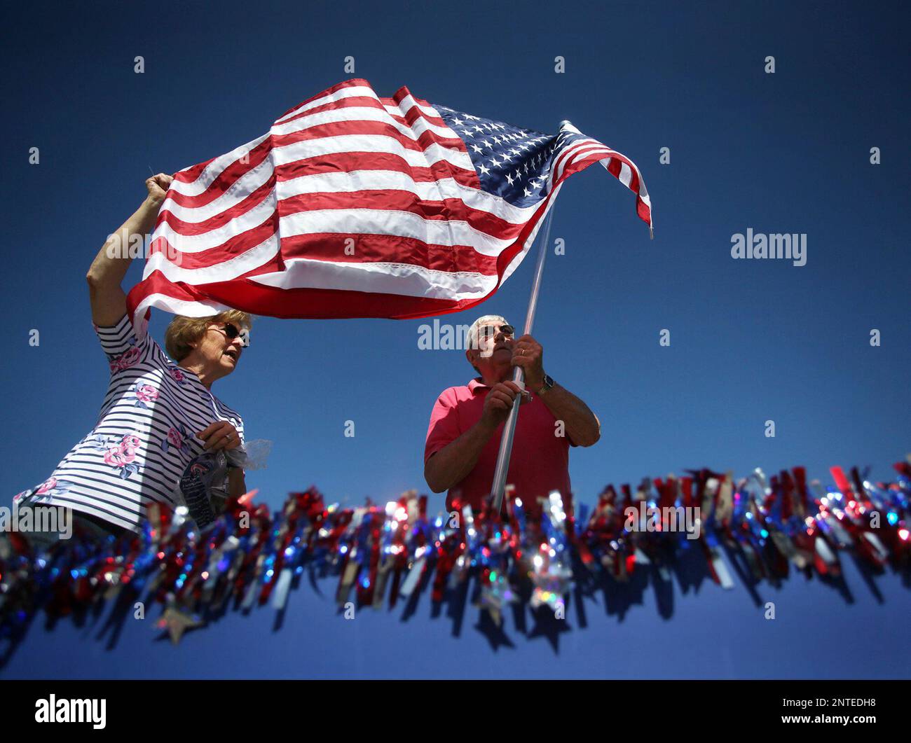 Judy Griggs, of Clarks Summit, Pa., and her husband Howard Griggs lift ...