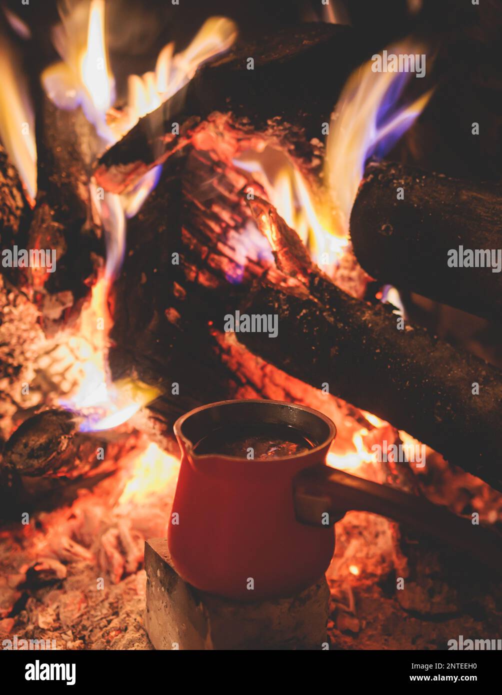 Warm by the fire, cozy winter night in the scandinavian cottage house ...