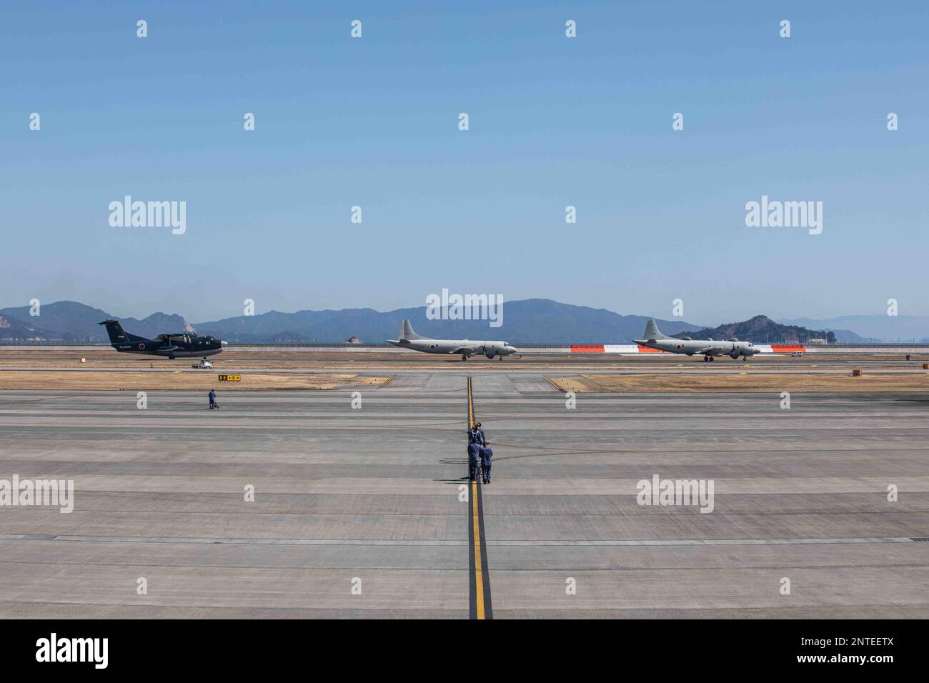 Japan Maritime Self-Defense Force OP-3C, P-3C and a US-2 taxi off the ...