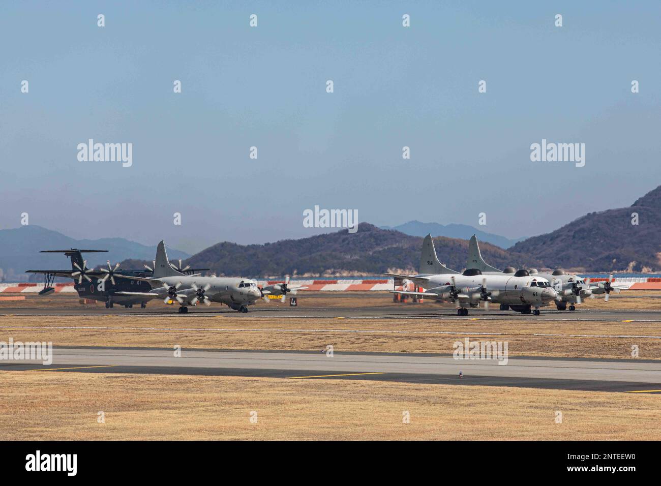 Japan Maritime Self-Defense Force OP-3C, P-3C and a US-2 stage during a ...