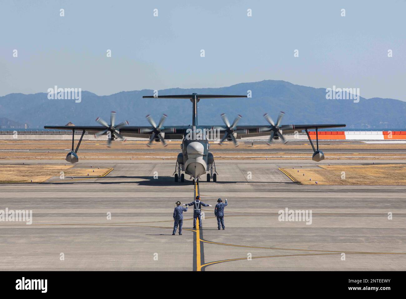 A Japan Maritime Self-Defense Force US-2 taxis off the runway following ...