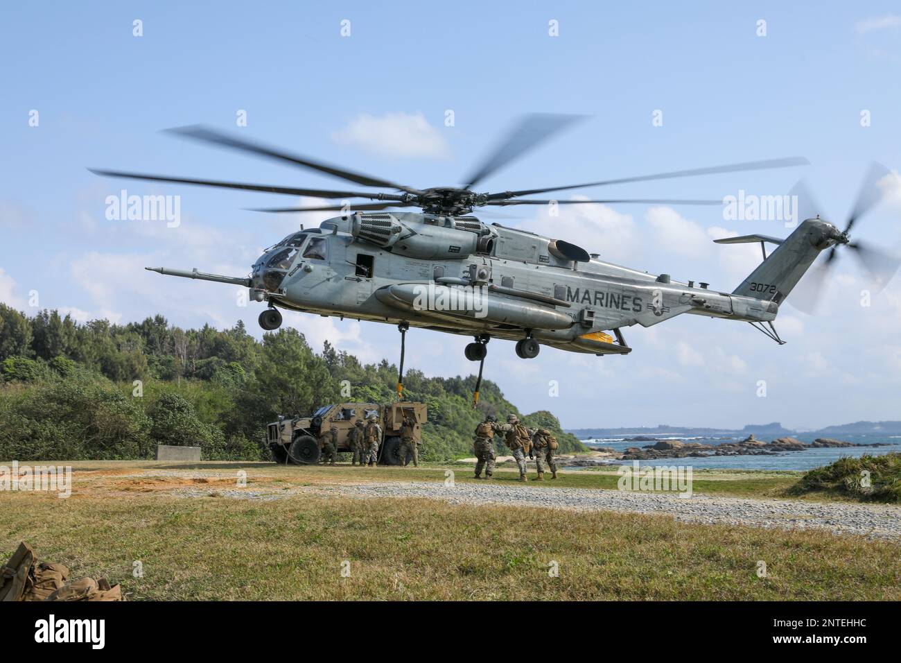 U.S. Marines with Combat Logistics Battalion (CLB) 4 attach a Joint ...