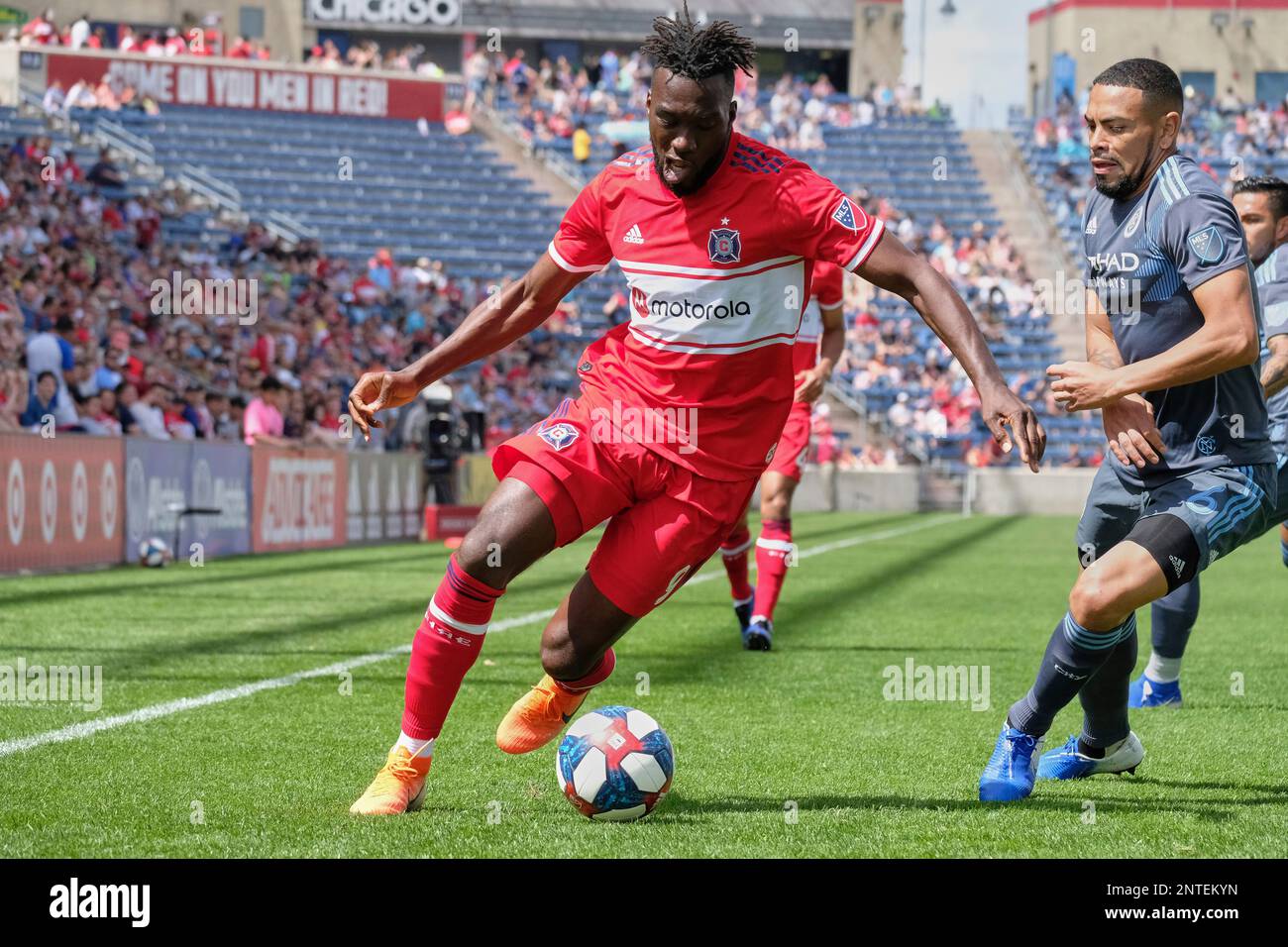 CHICAGO, IL - MAY 25: Chicago Fire forward C.J. Sapong (9) battles with ...