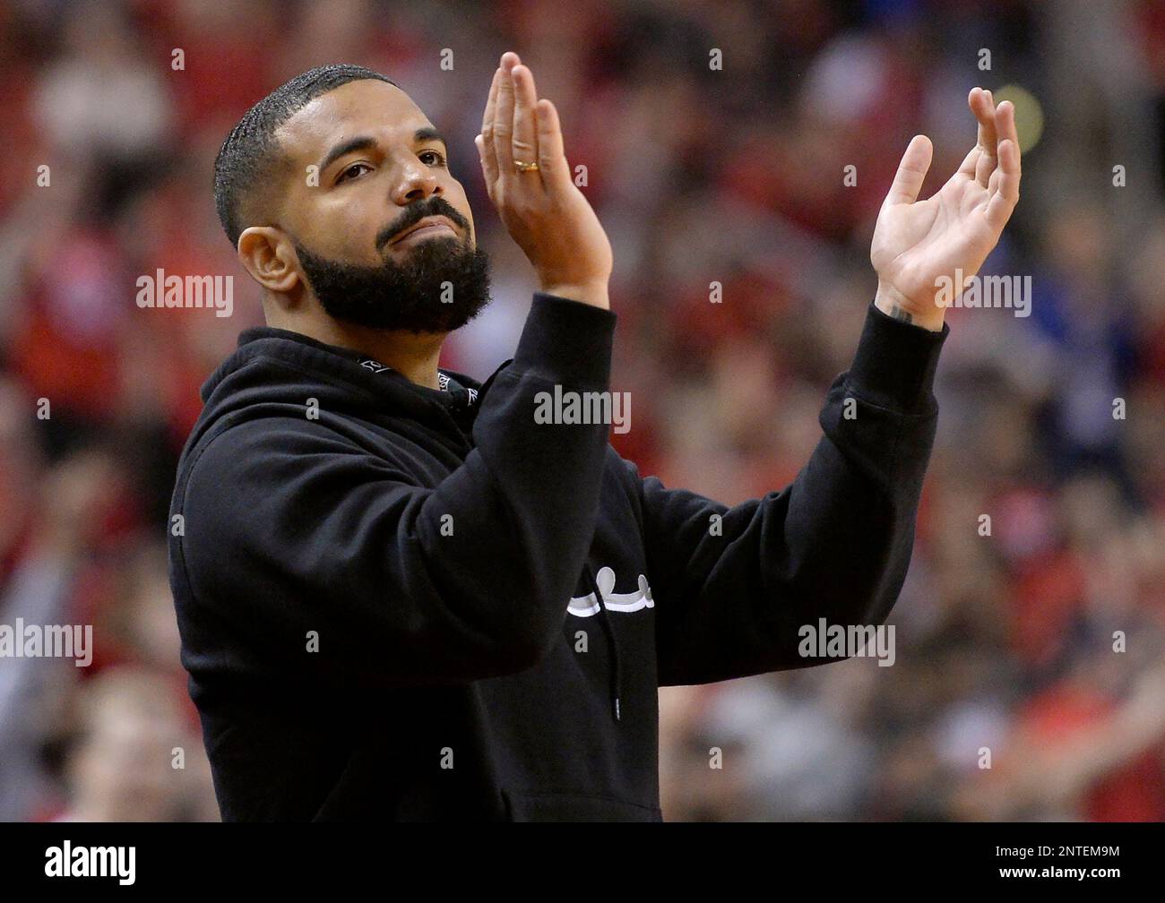 Drake cheers from courtside during the first half of Game 6 of the NBA ...