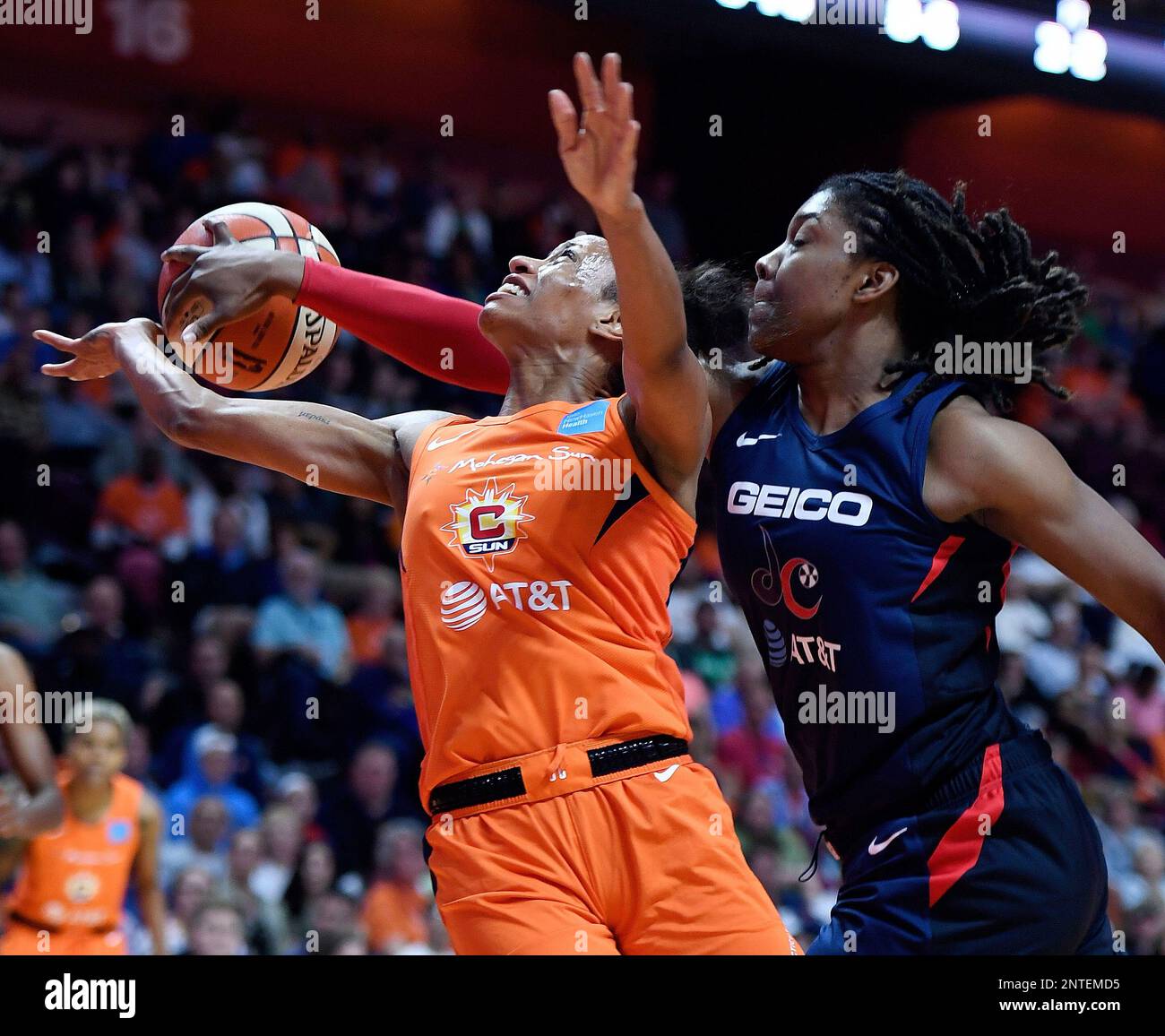 Washington Mystics guard Shatori Walker-Kimbrough, right, blocks a shot ...