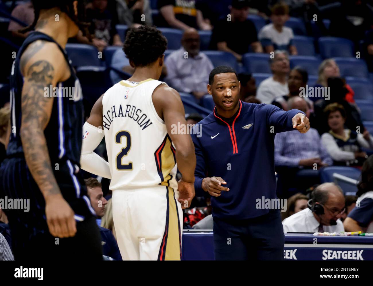 New Orleans Pelicans head coach Willie Green, right, talks with guard ...