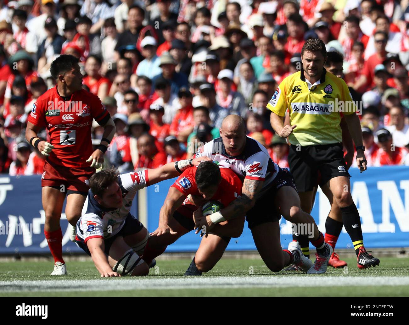 Rebels' Richard Hardwick (L) and Bill Meakes(L) struggles to stop ...