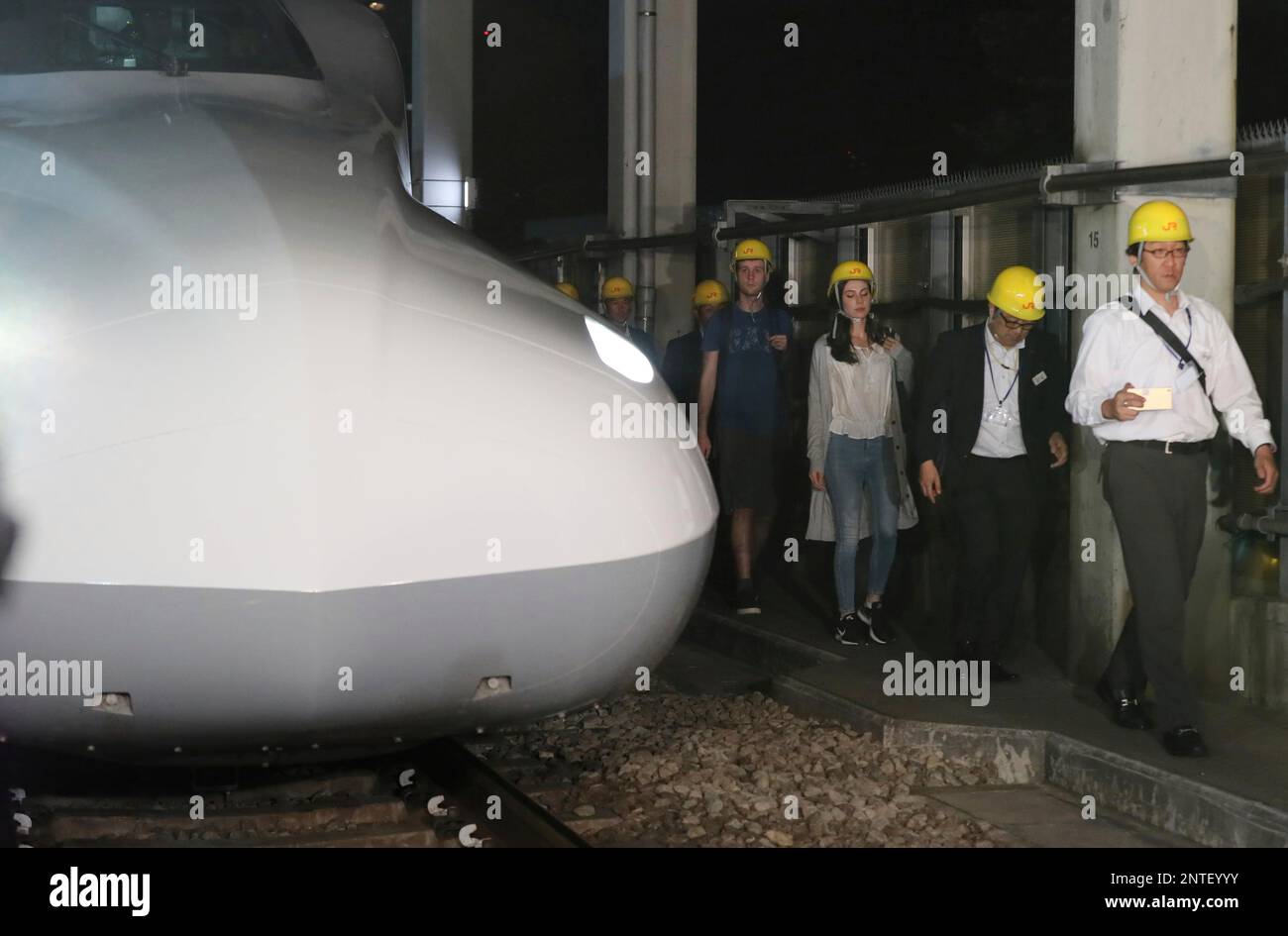 Foreign tourists and passengers get off Shinkansen bullet train on the ...