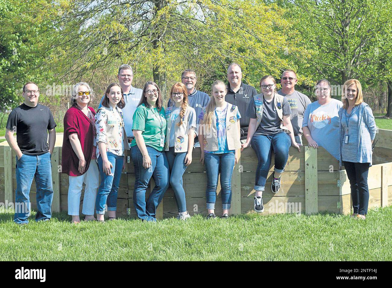 Members of Girl Scout Troop 30271 pose for a photo alongside their ...