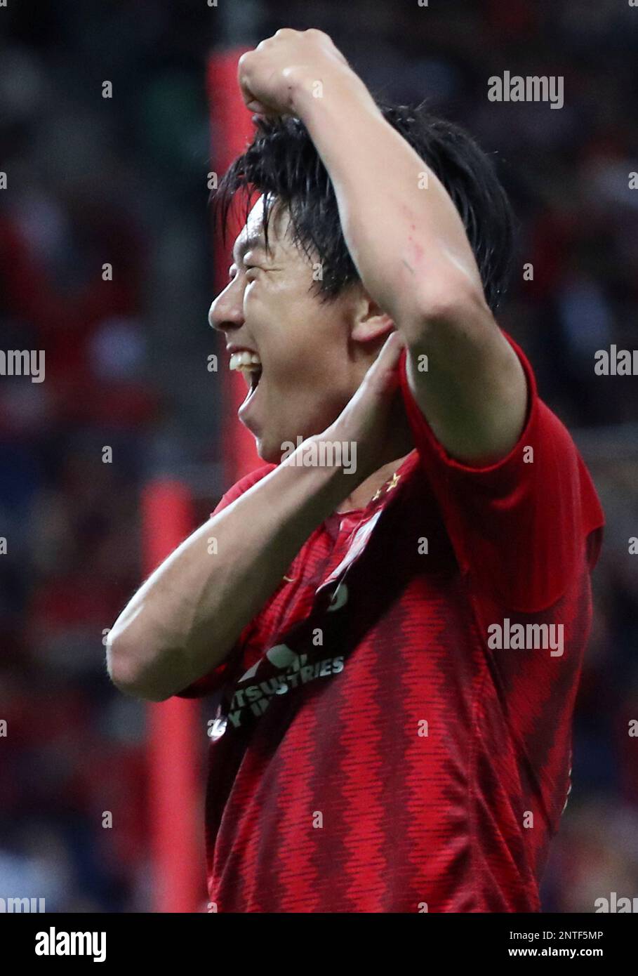 Yuki Muto of Japan's Urawa Red Diamonds celebrates after scoring in the ...