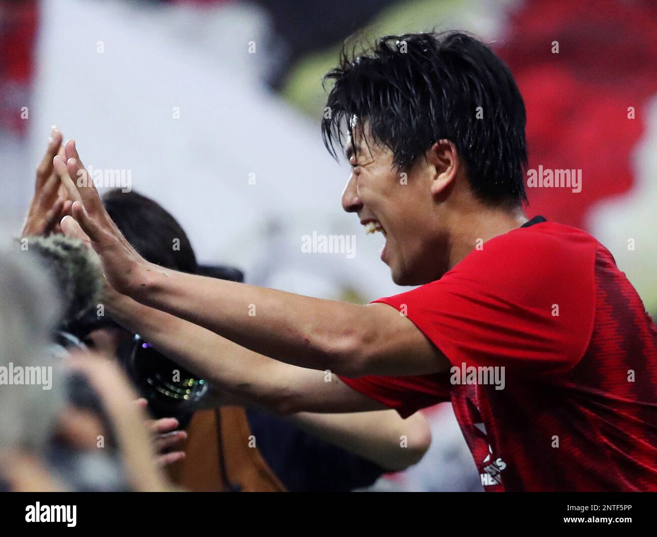 Yuki Muto of Japan's Urawa Red Diamonds celebrates after scoring in the ...