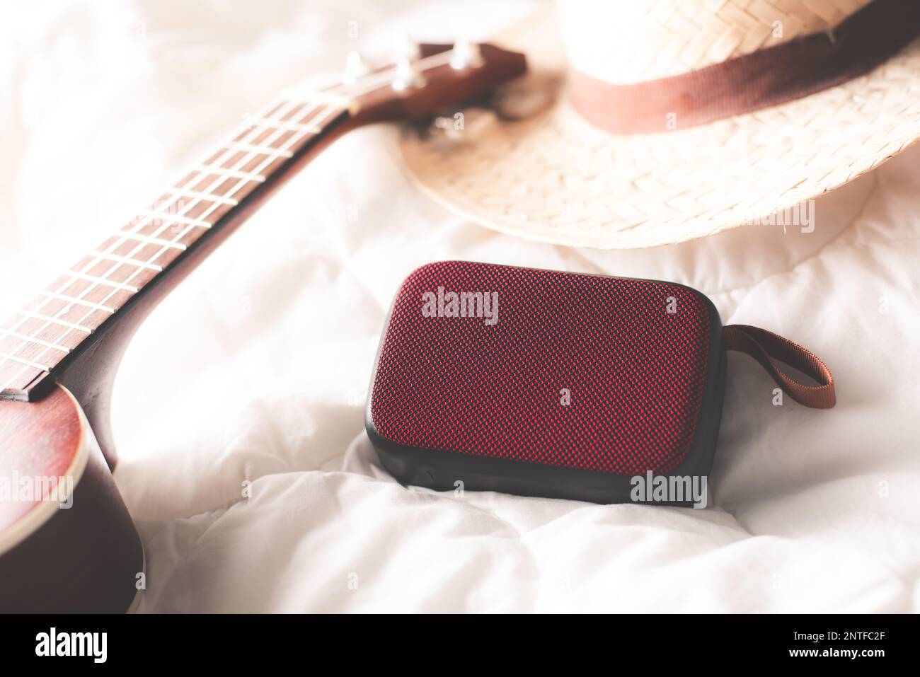 relaxing concept, Using wireless portable speaker on the bed Stock ...