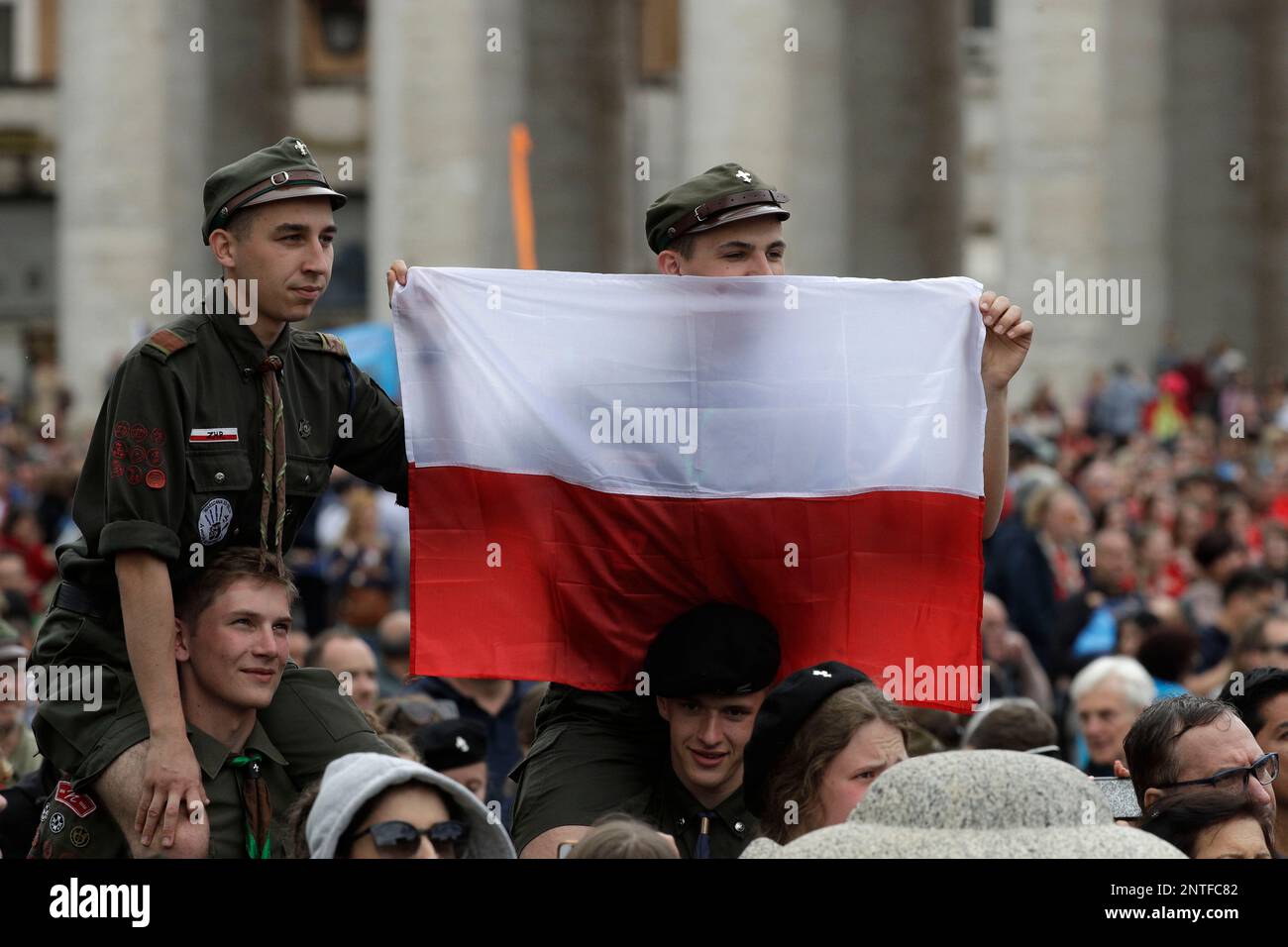 Pilgrims show a polish flag during Pope Francis' Regina Coeli noon ...