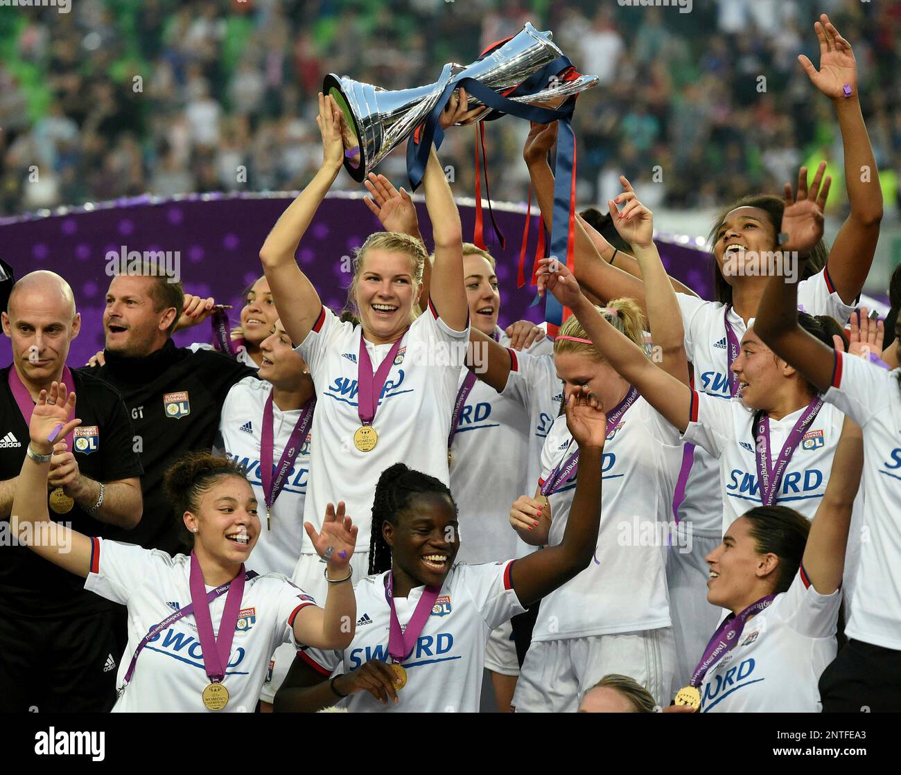 Players of Olympique Lyon celebrate with the trophy after the women's ...