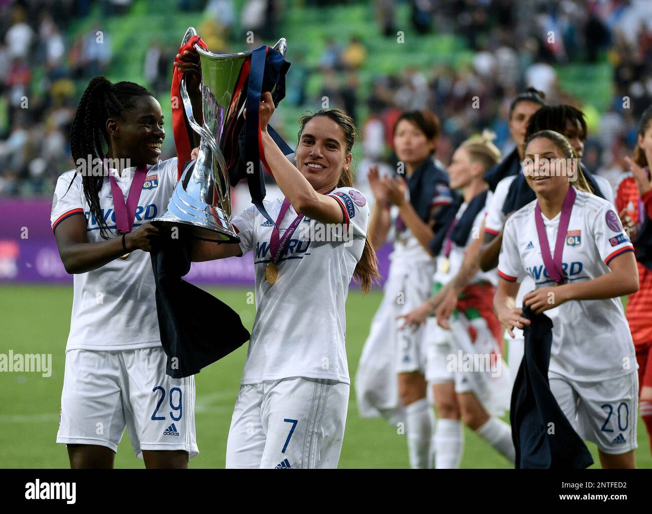 Griedge M'Bock Bathy, left, and Amel Majri of Olympique Lyon lift the ...