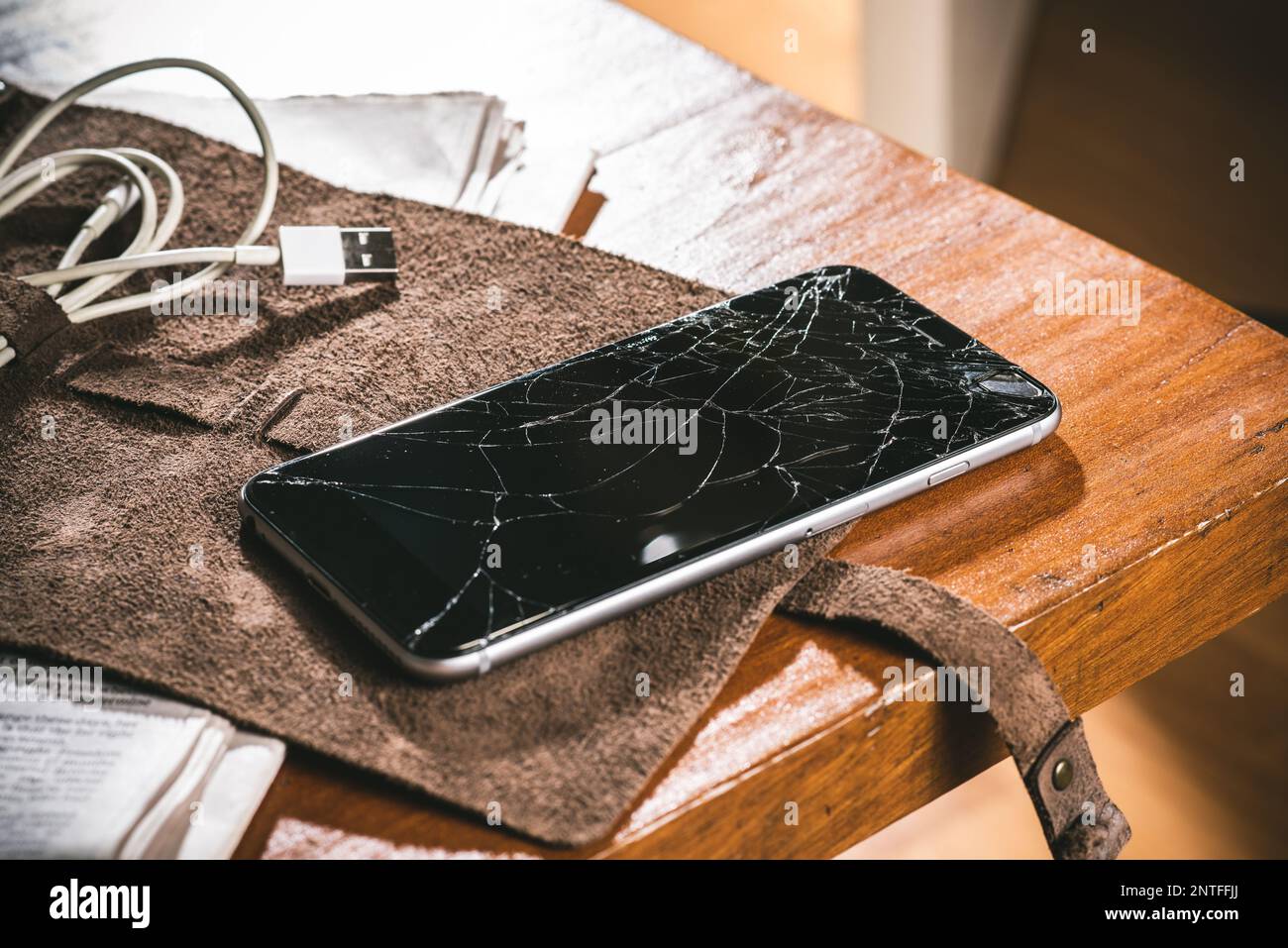 closeup cracked screen on broken smart phone Stock Photo - Alamy
