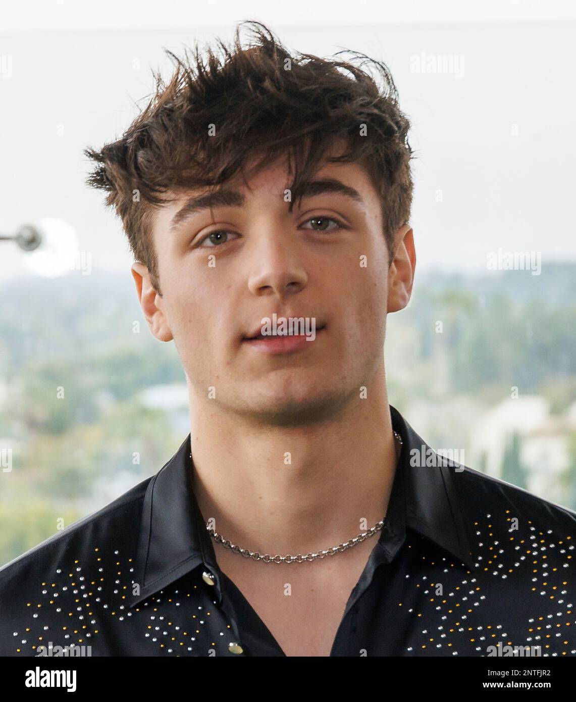 Asher Angel attends a photo call for "Shazam! Fury of the Gods" on Monday, Feb. 27, 2023, at The ...