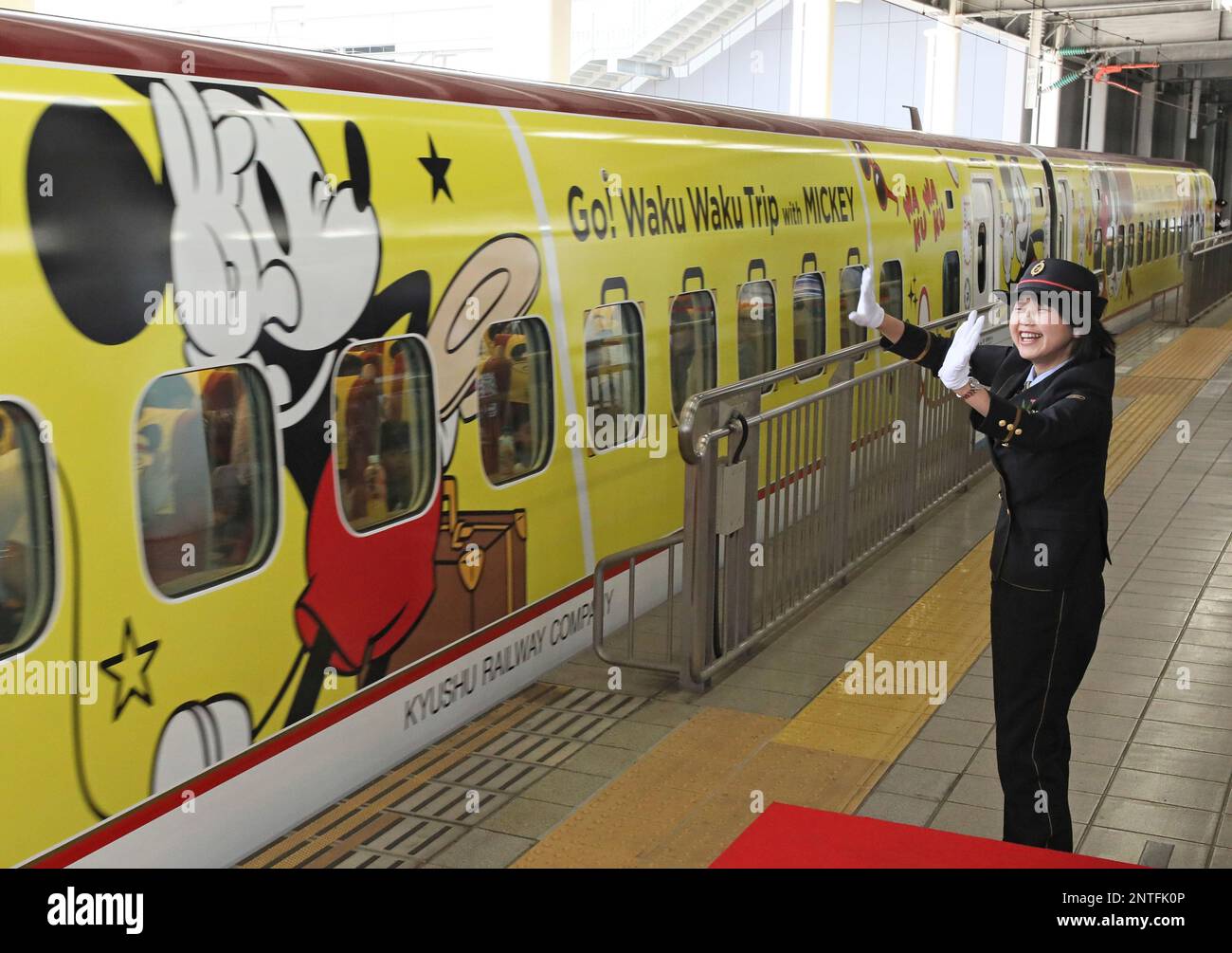 A "Mickey Mouse Shinkansen" bullet leaves JR Hakata Station in Fukuoka ...