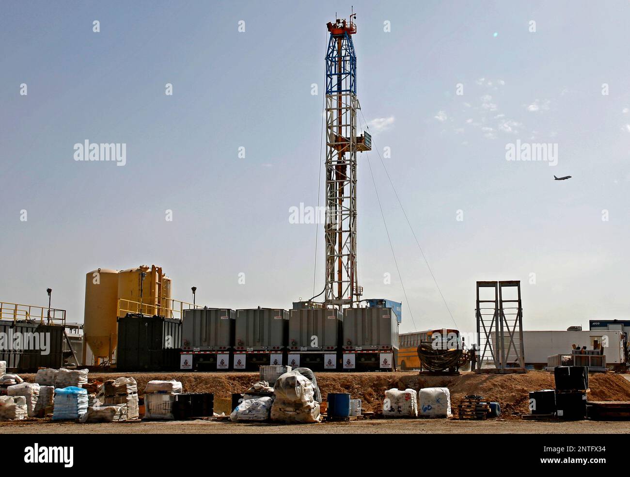 In this April 17, 2019, photo a Latshaw Drilling Rig operates on a ...
